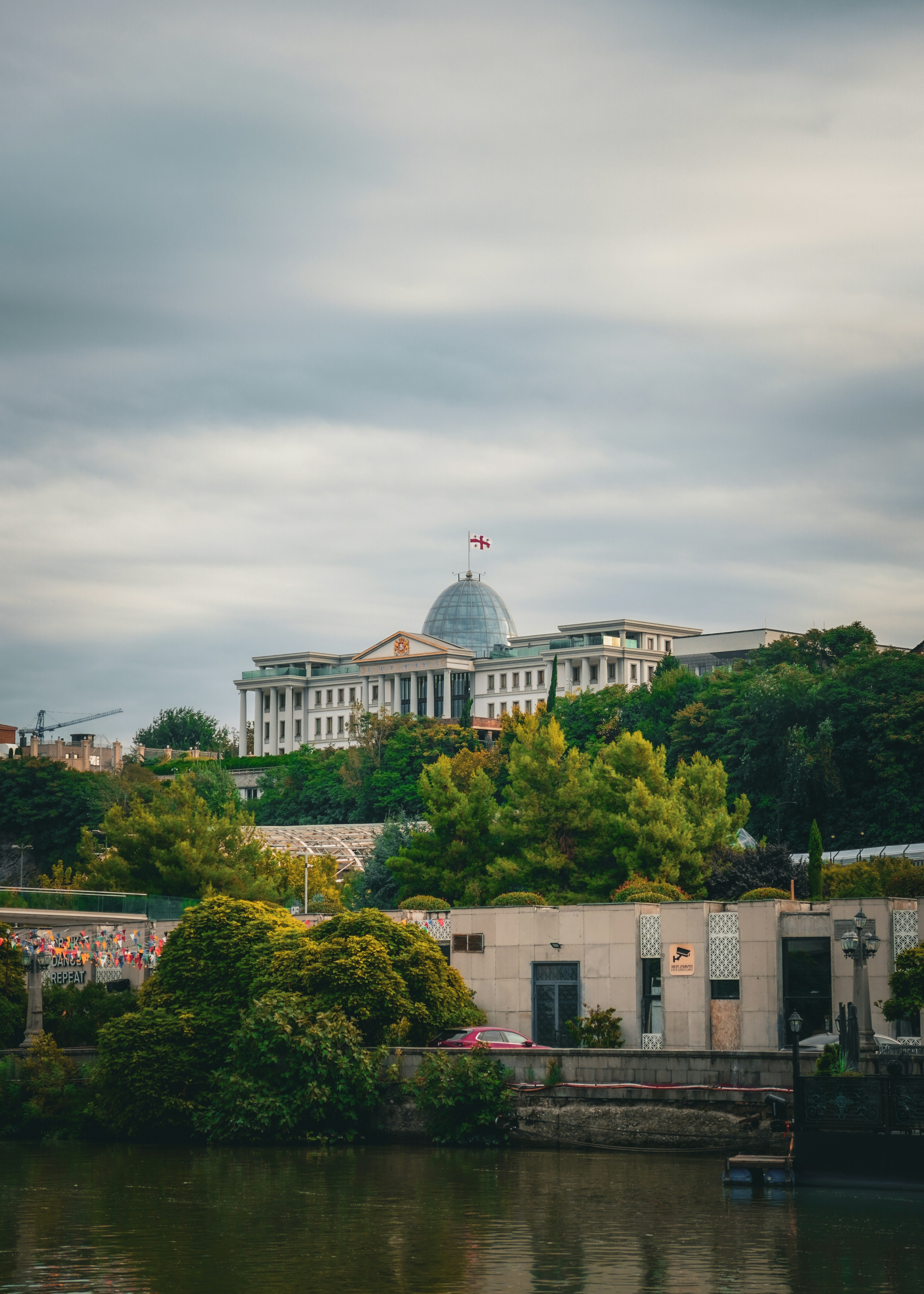 Dome-lidded Capitol Over the Riverbank