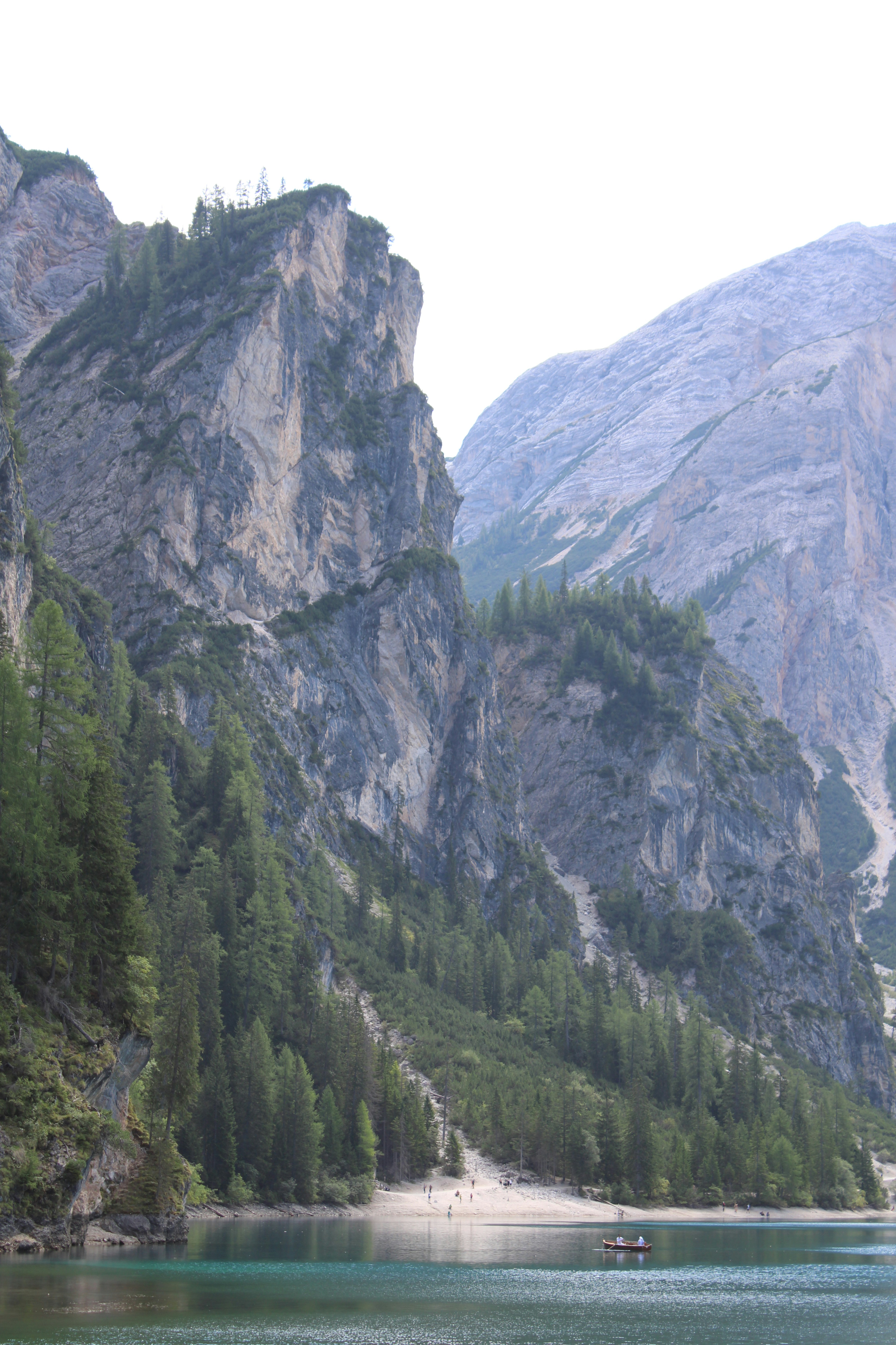 Azure Basin at the Foot of Towering Peaks