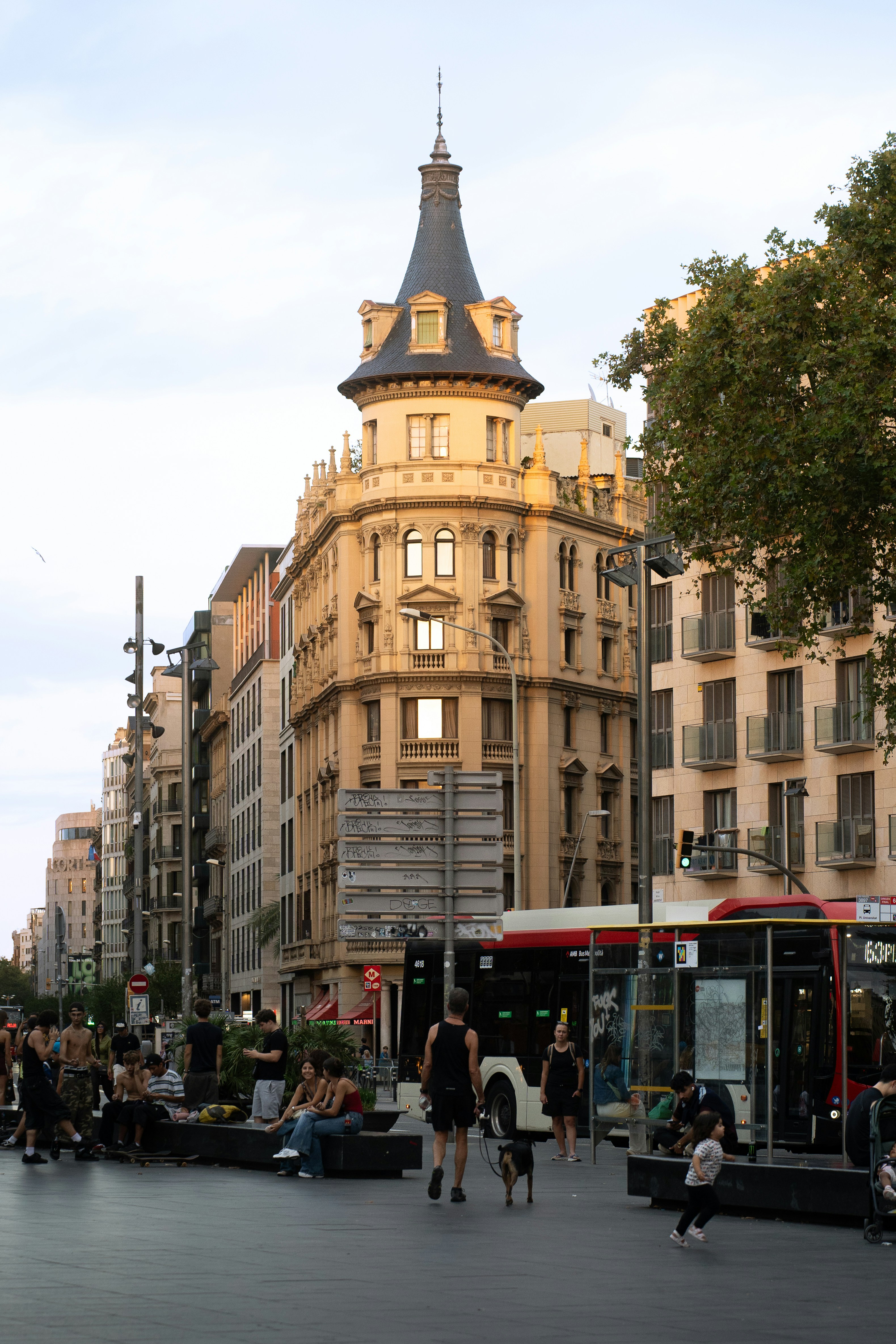 Urban Castle Tower Amid Busy Boulevard