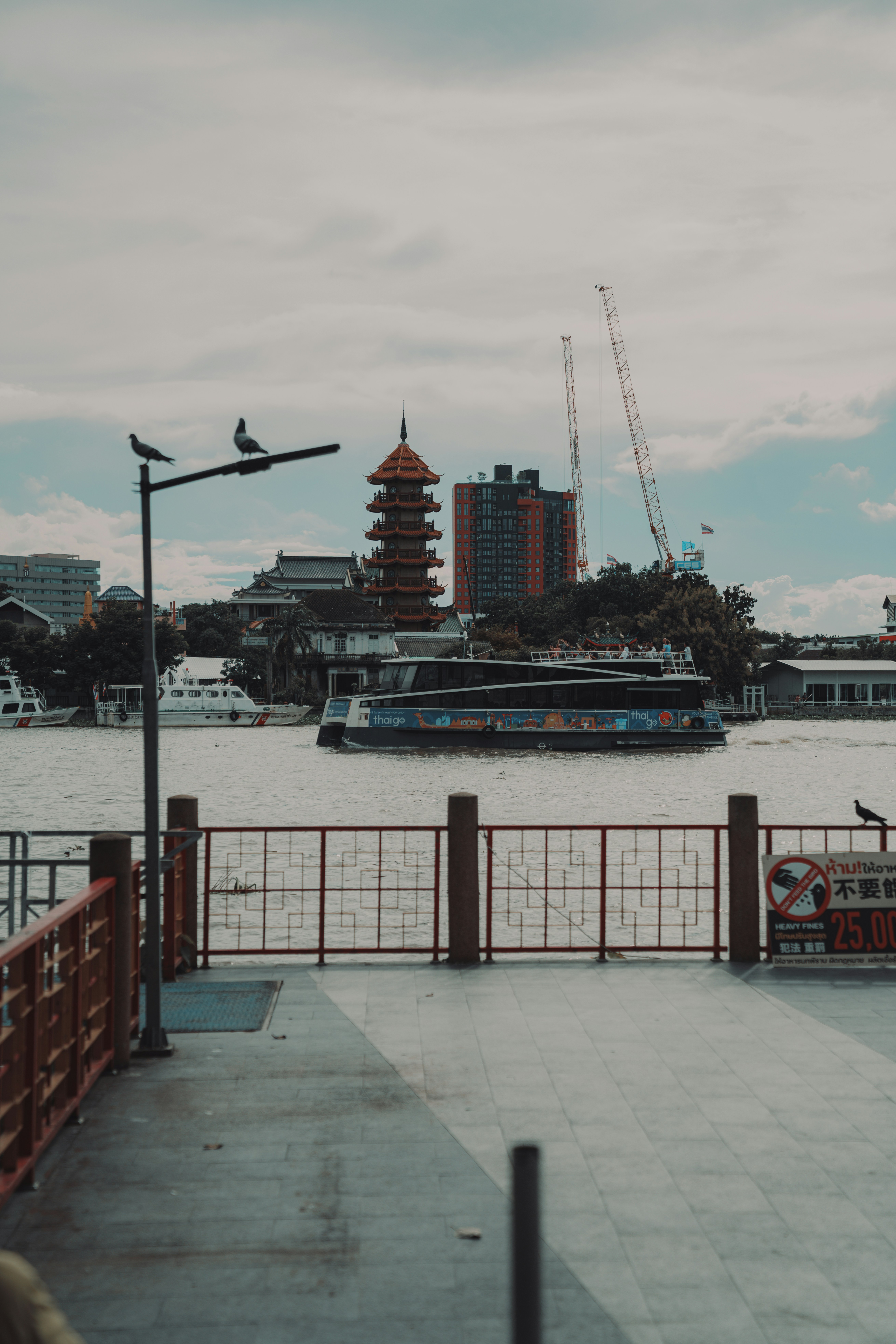 City by the Waterfront: A Quiet Linear Moment with a Pagoda Silhouette