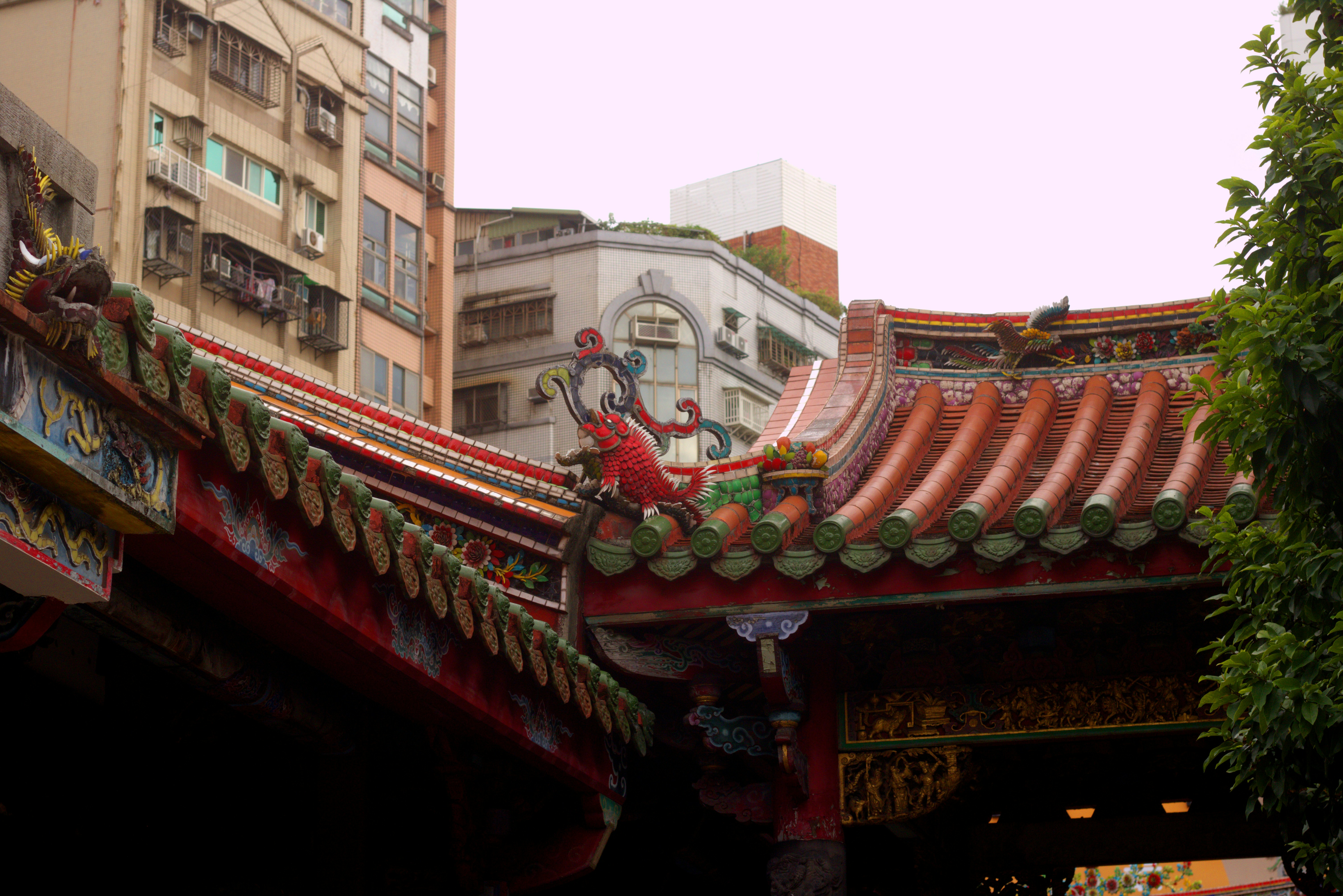 Dragon-crested Rooflines and Urban Quiet in a Temple Courtyard