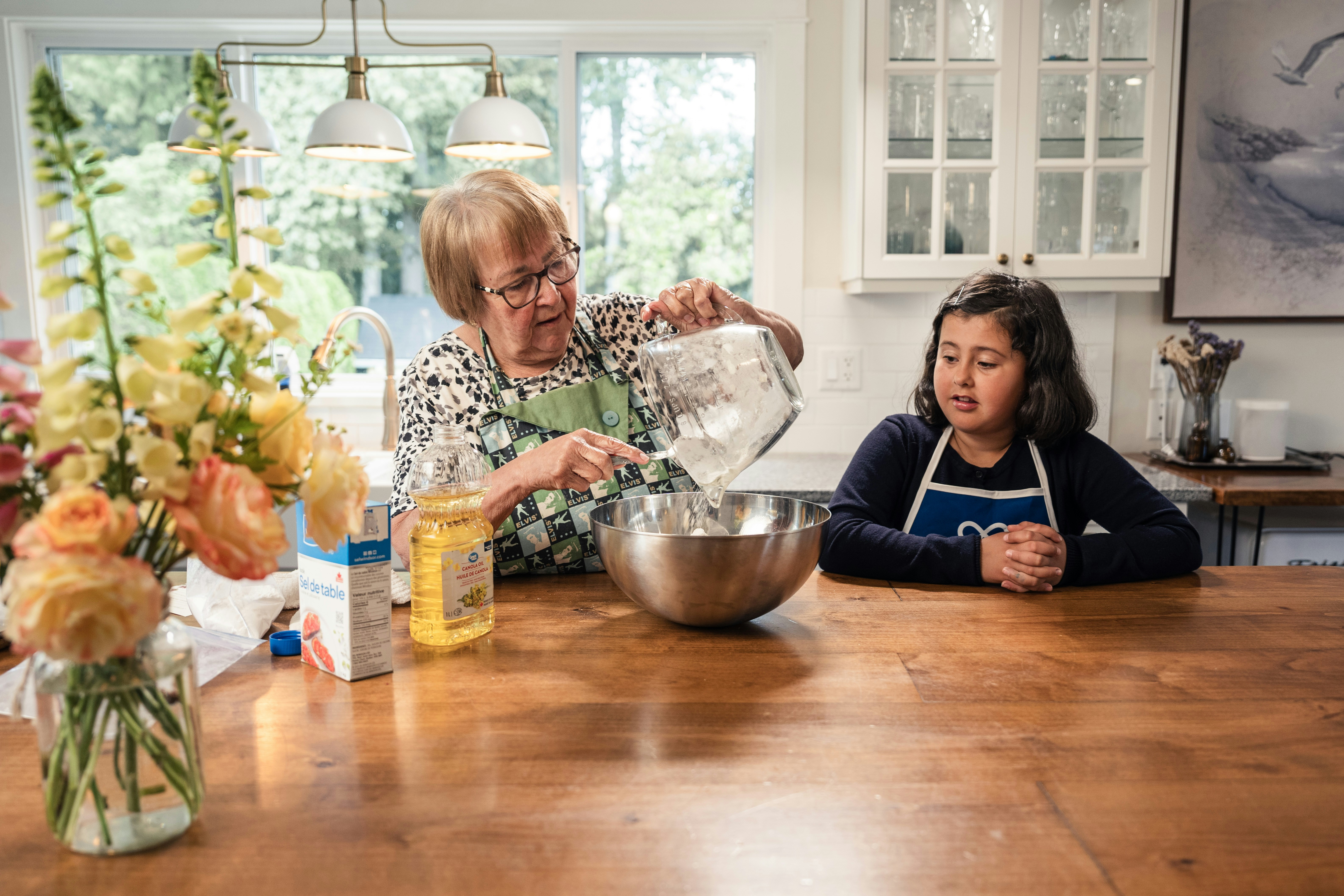 Generations in a Kitchen: Baking Lesson at the Wooden Table