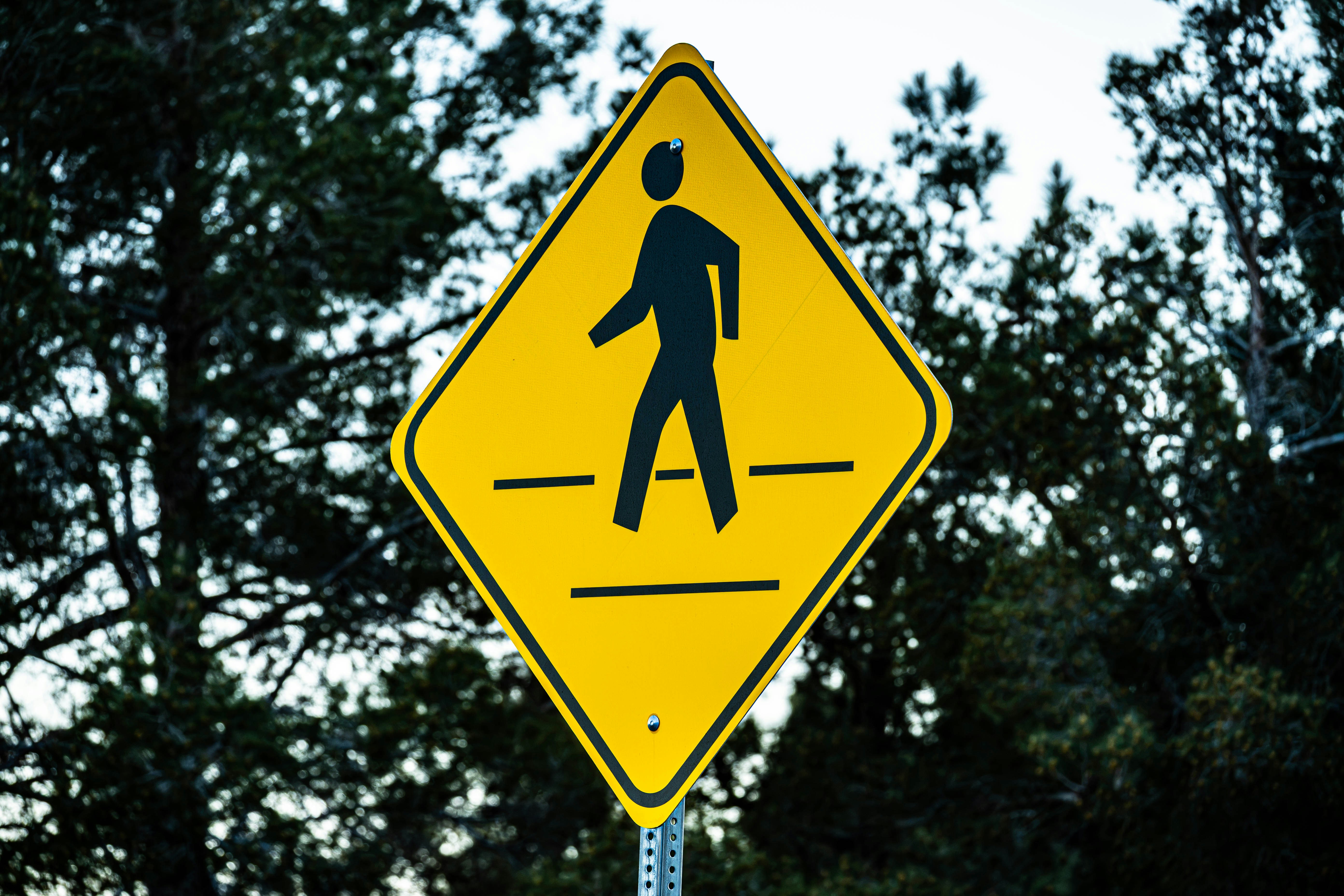 Yellow Pedestrian Signrise: A Bold Crossing Ahead