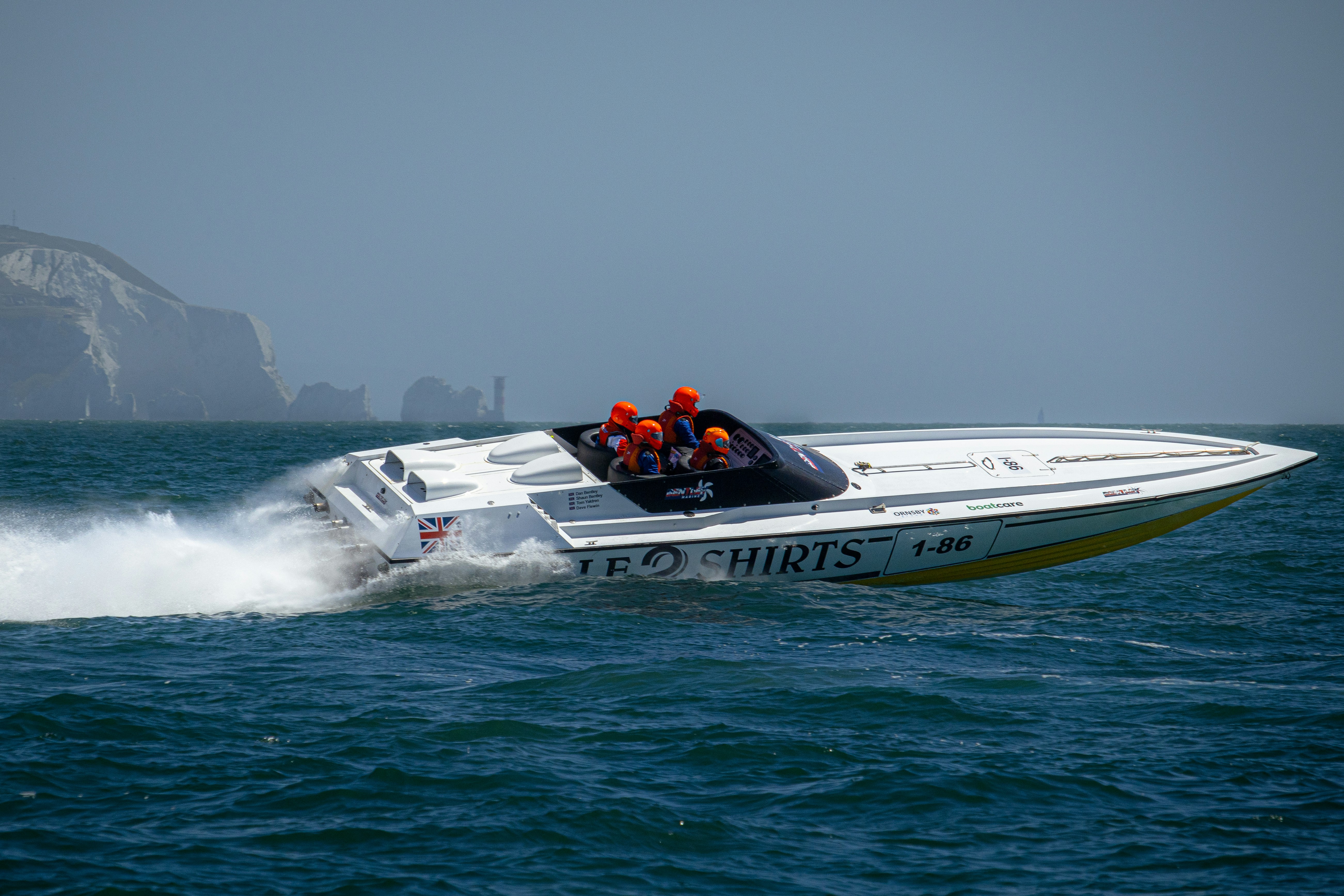 Racing Toward the Horizon: A Swift Powerboat in Sea Spray