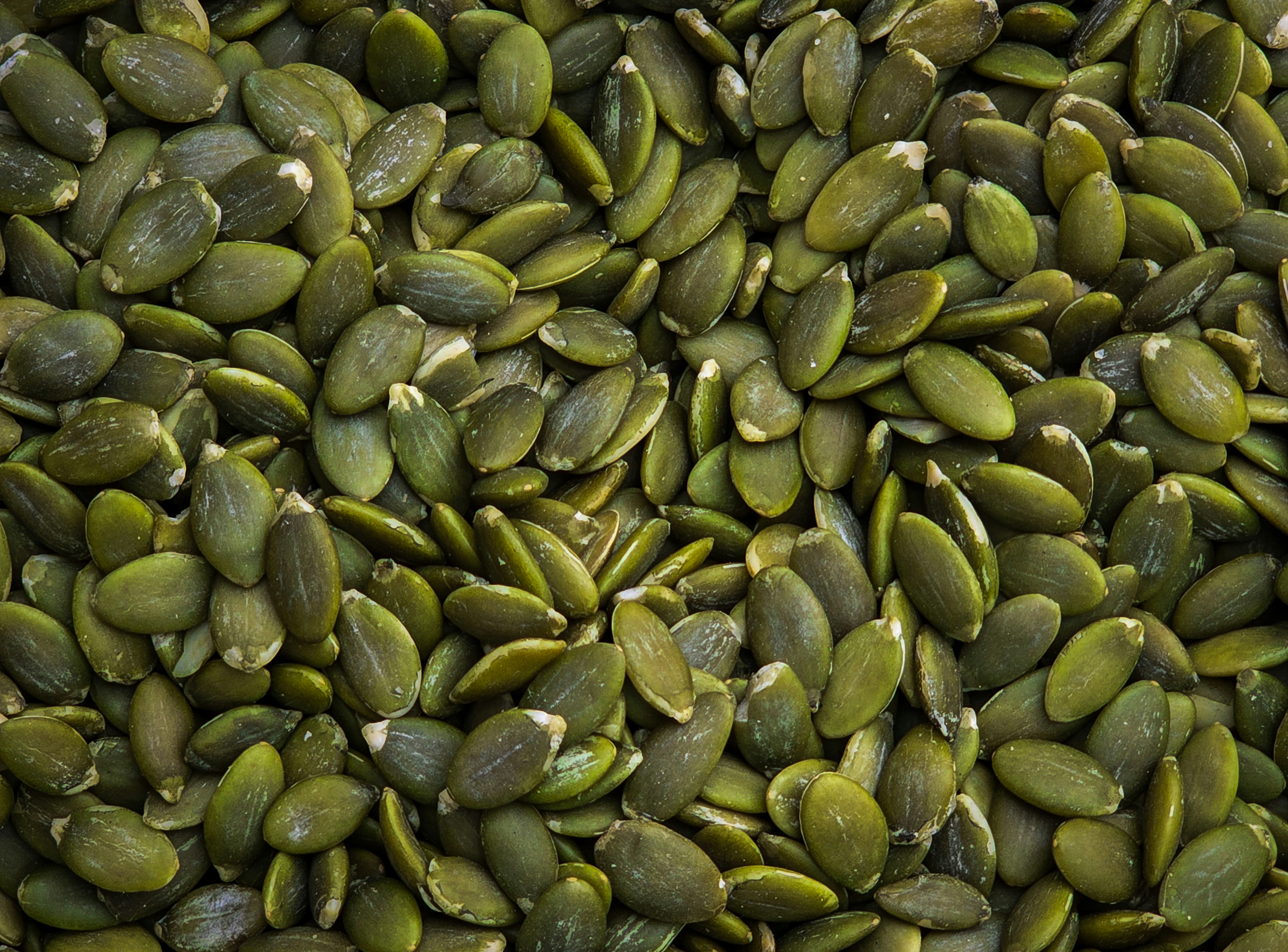 Green Seed Mosaic: A Close-Up of Pistachios in Focus