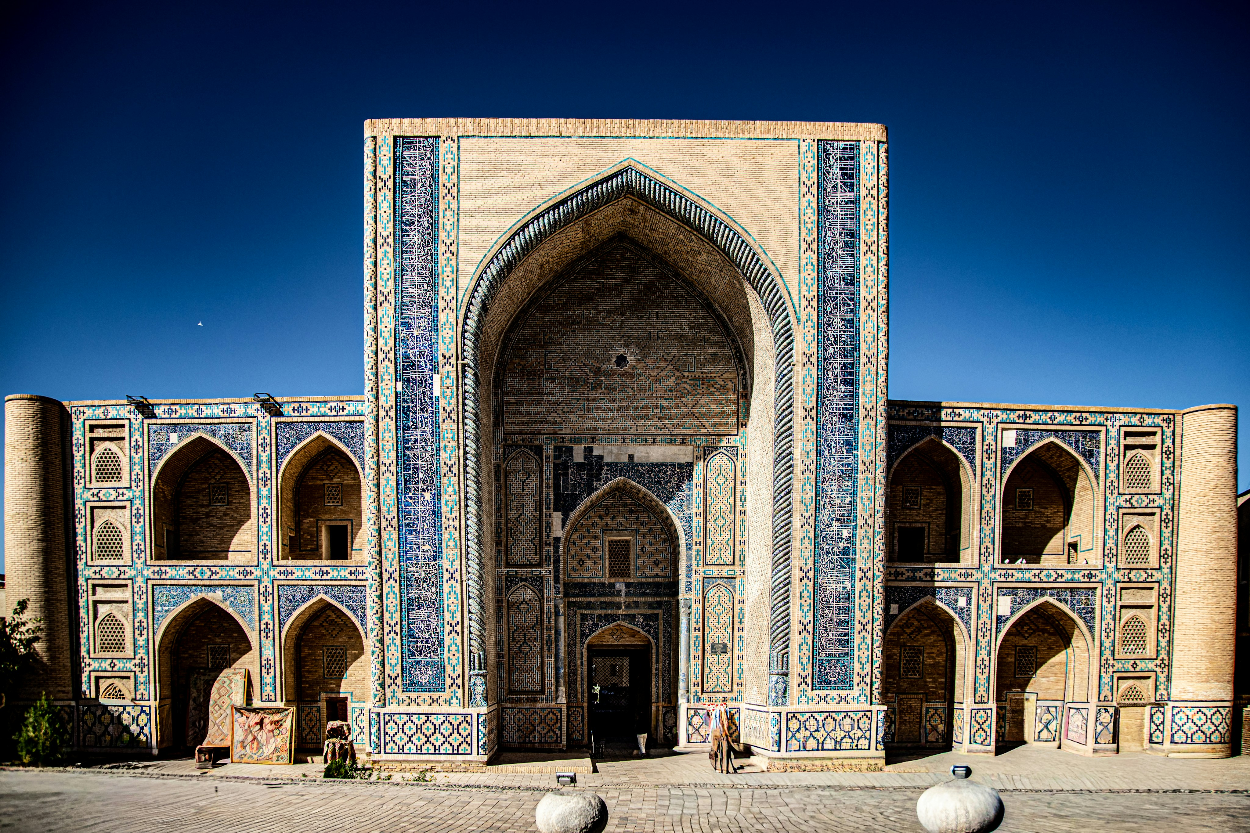 Gateway of Geometric Echoes: A Persian-iwan Ablaze in Cerulean Light