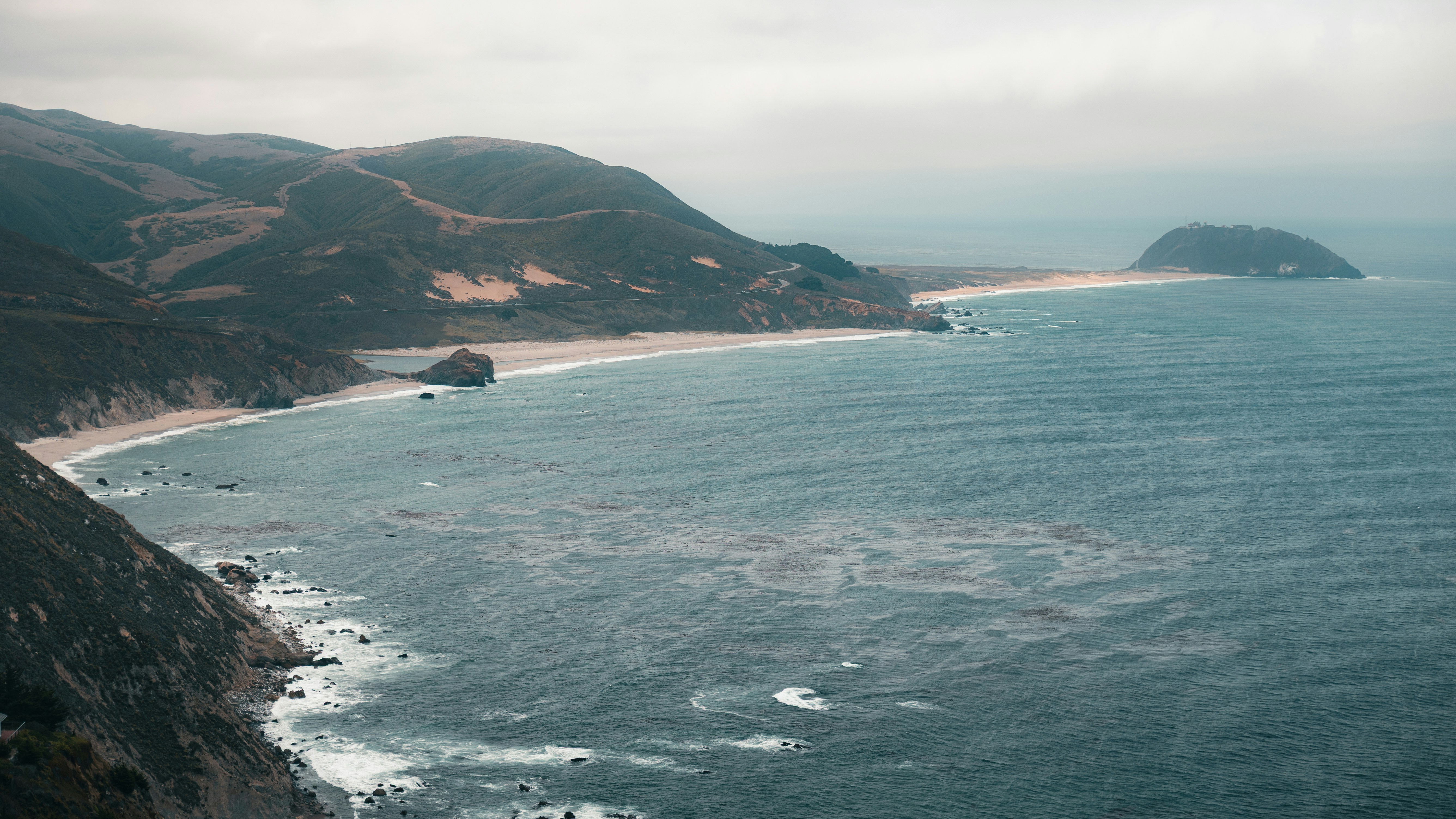 Coastal Promontory: A Quiet Convergence of Sea and Hills