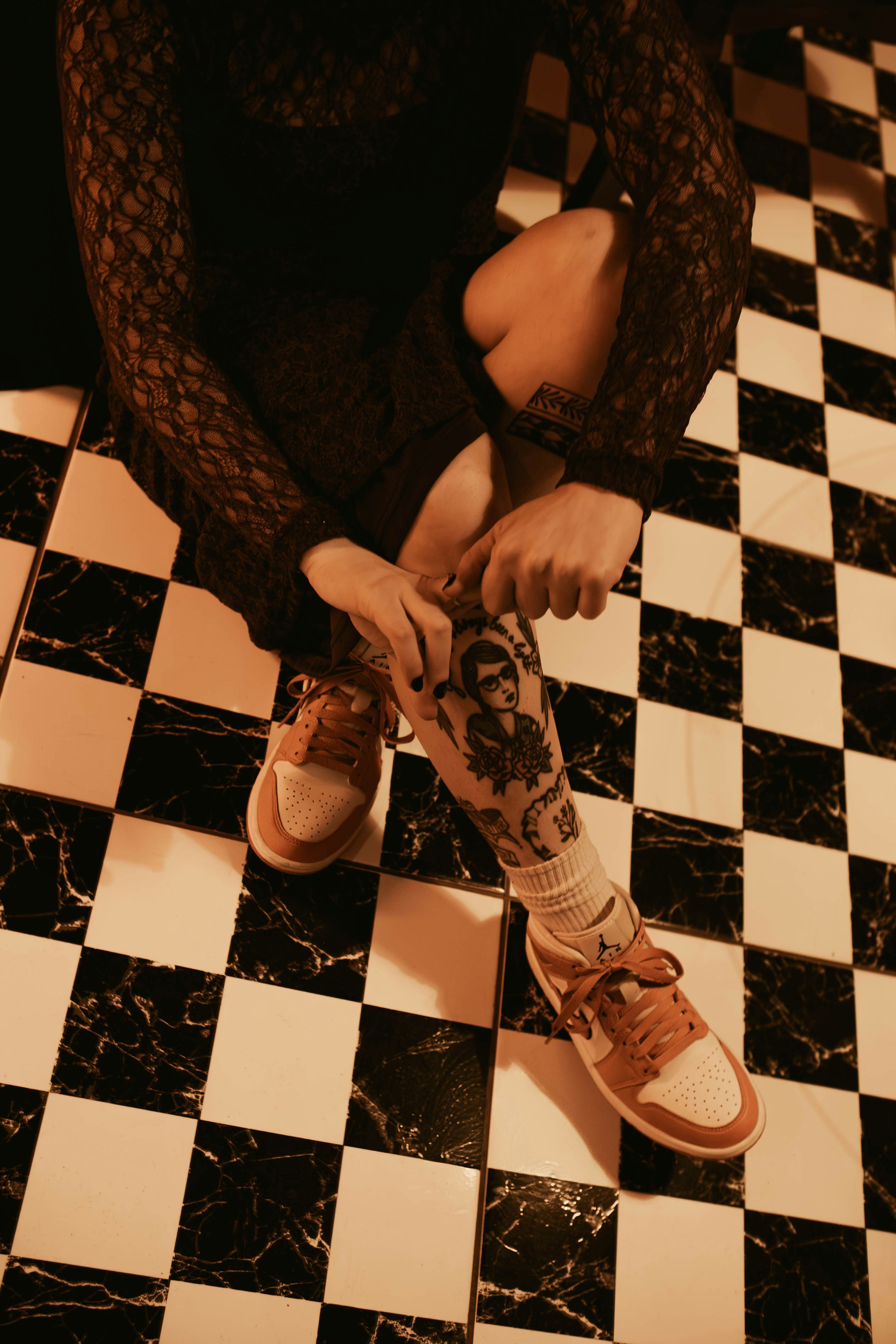 Tangled Lace and Ink: A Quiet Moment on Checkerboard Floors