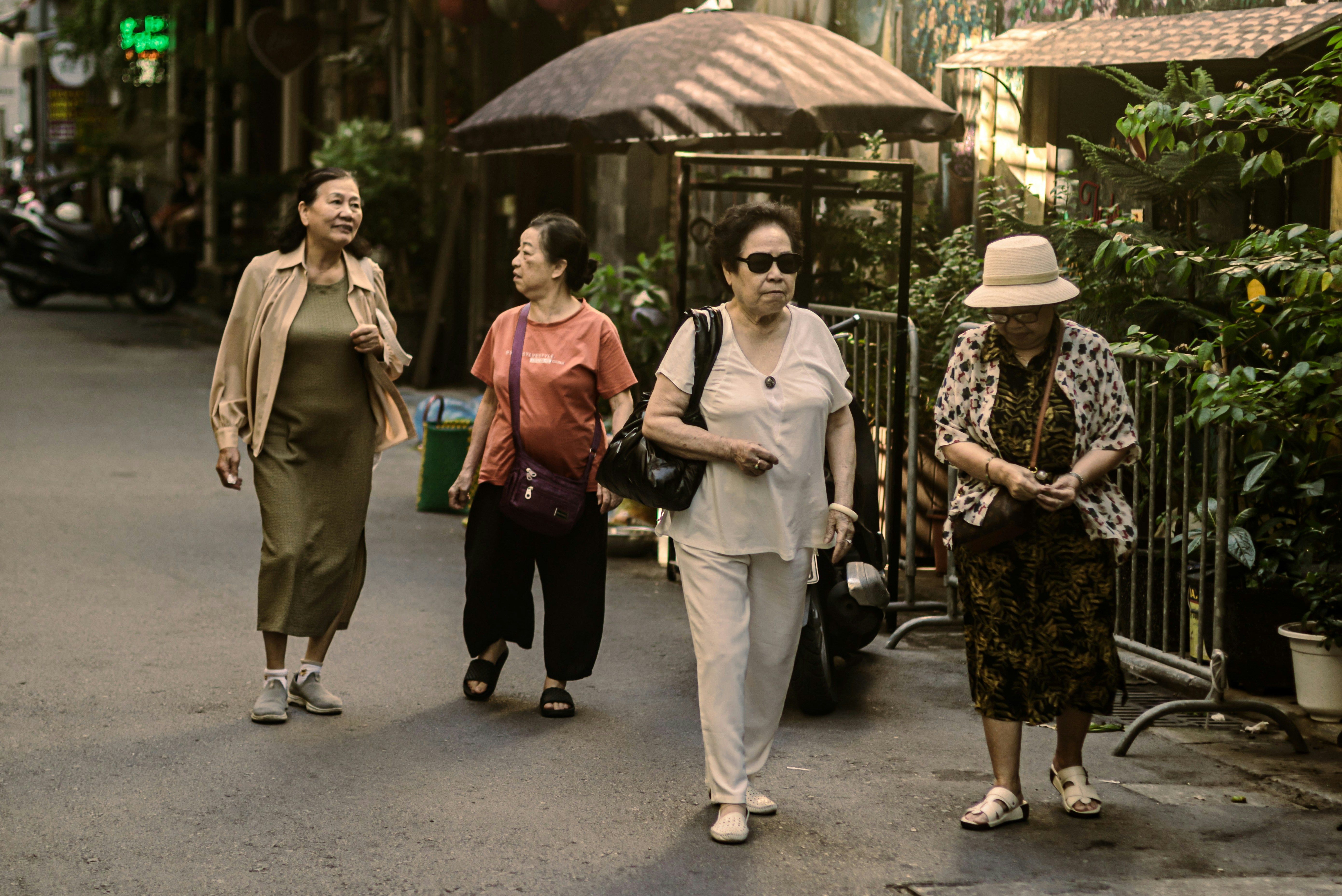 Four Figures on a Quiet City Street