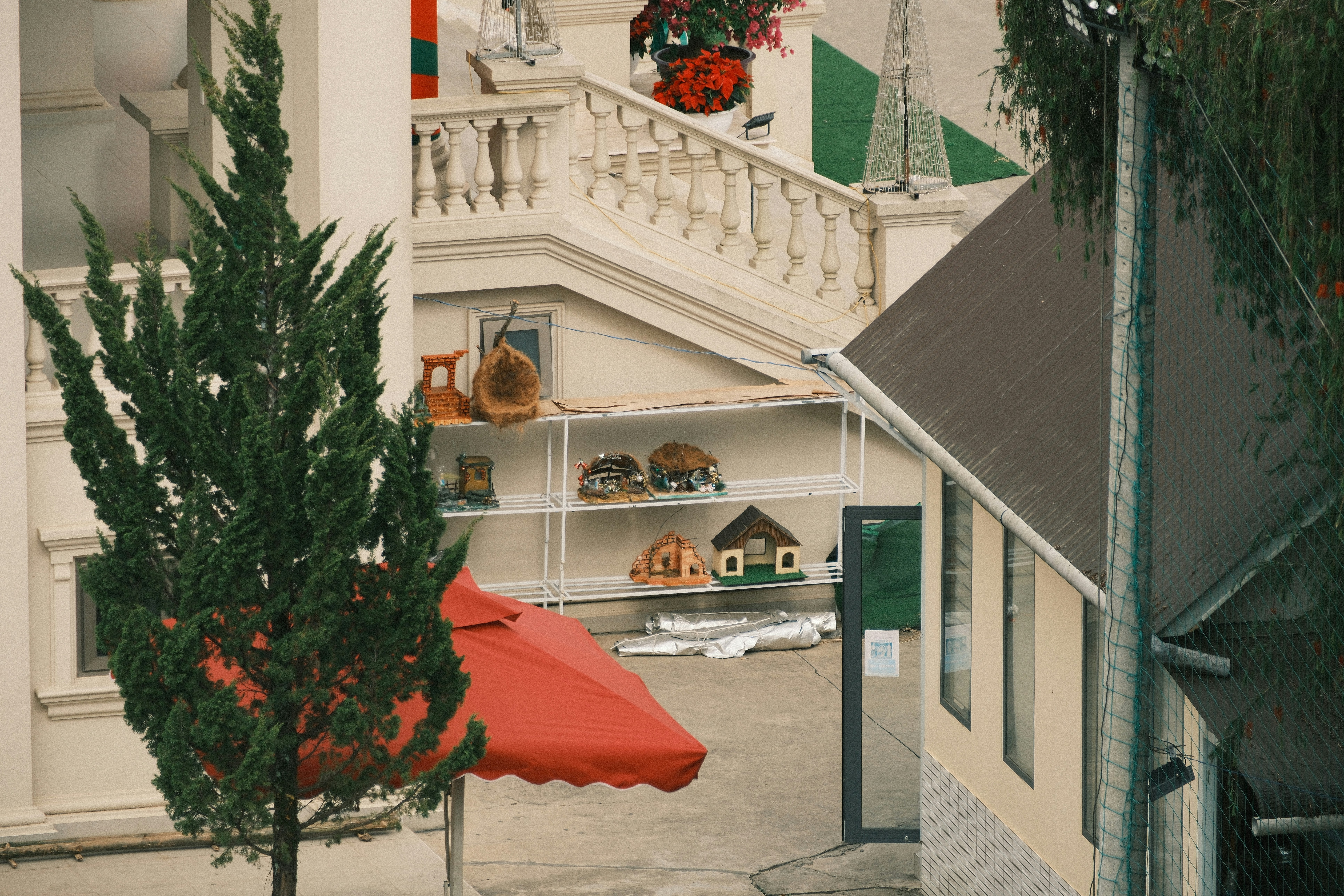 Miniature Village Display Under an Outdoor Terrace