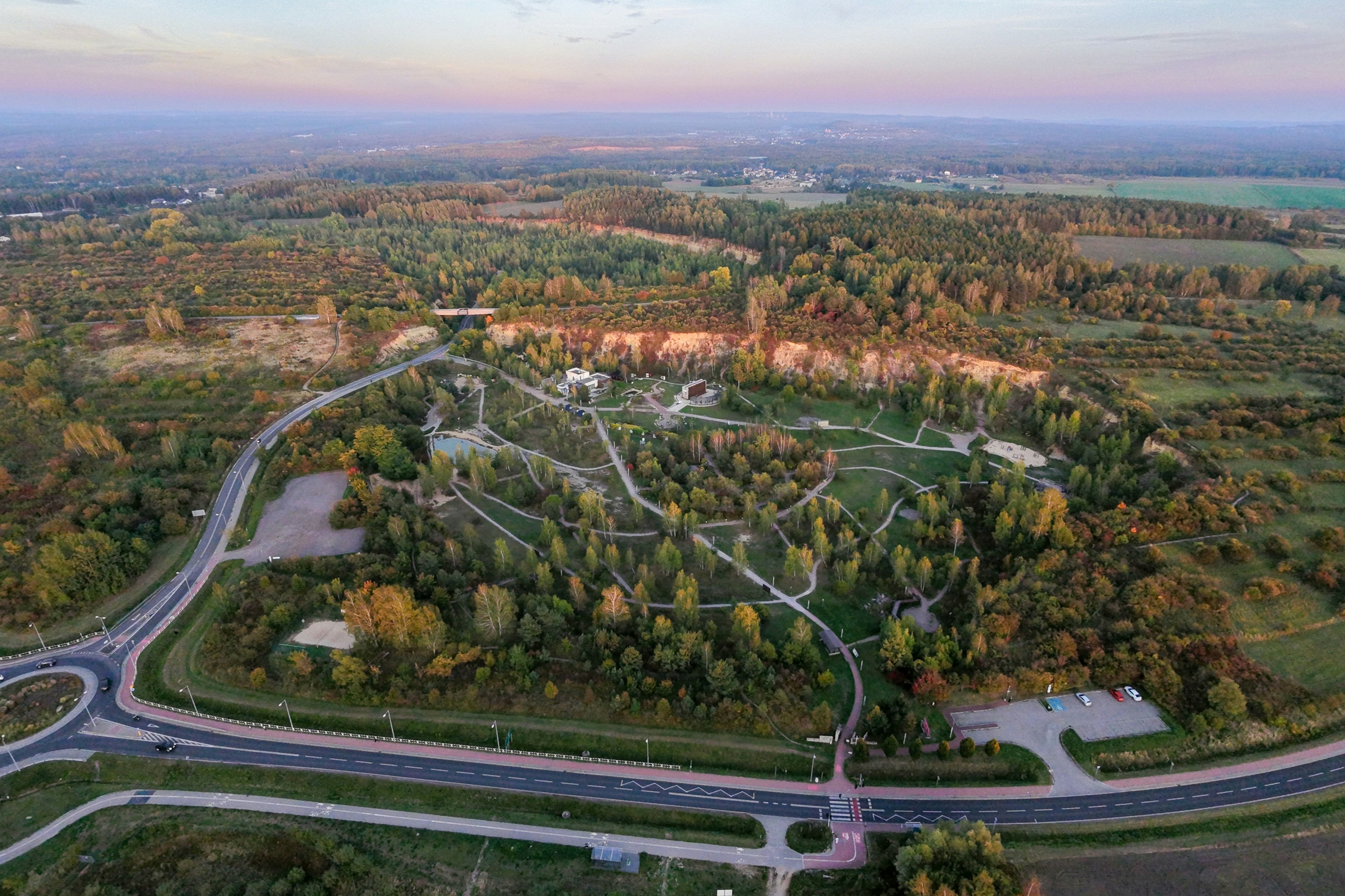 Orchard Ridge: Aerial tapestry of roads, trees, and terraces