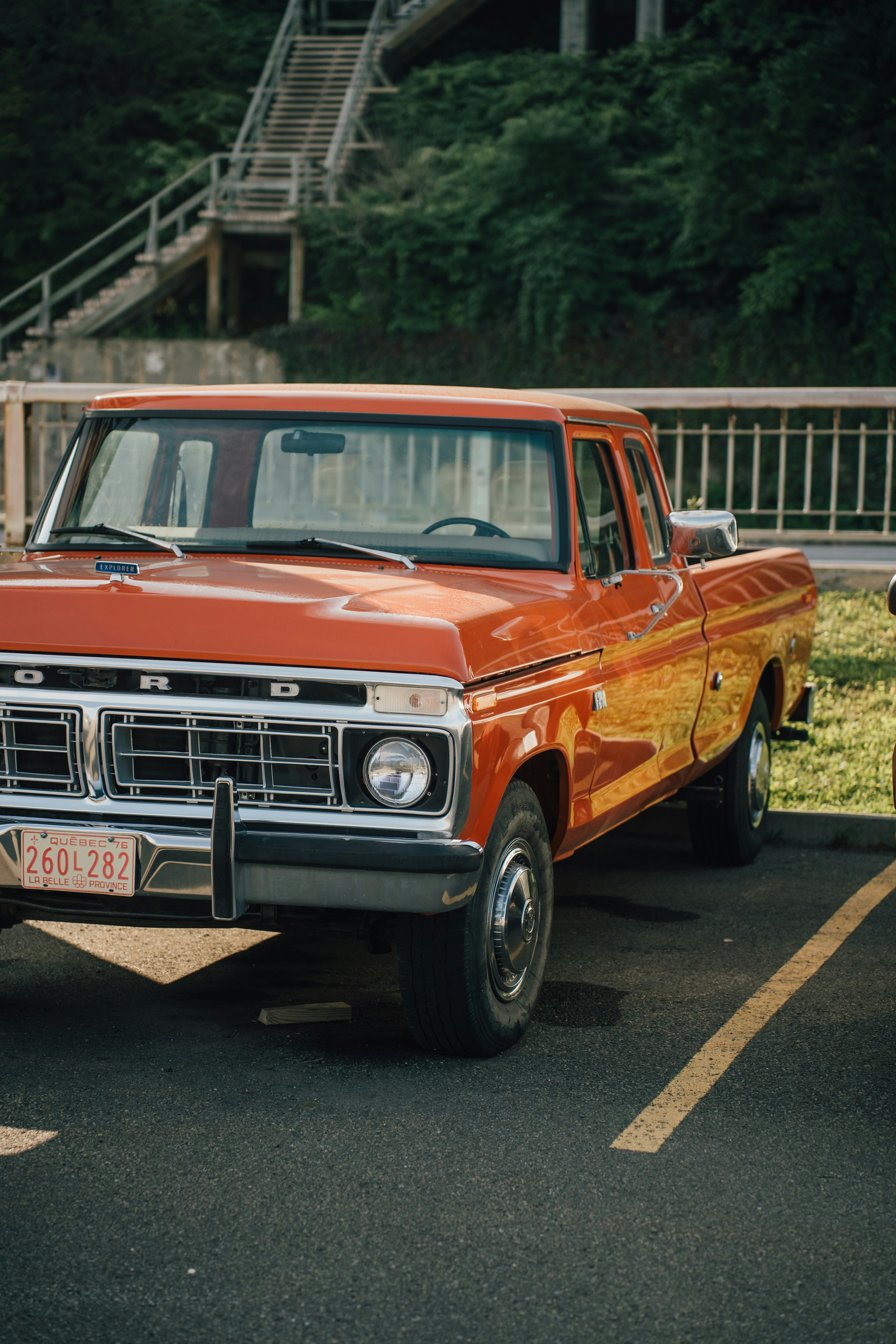 Copper Chrome: A Classic Ford Truck Paused by a Quiet Parking Lot