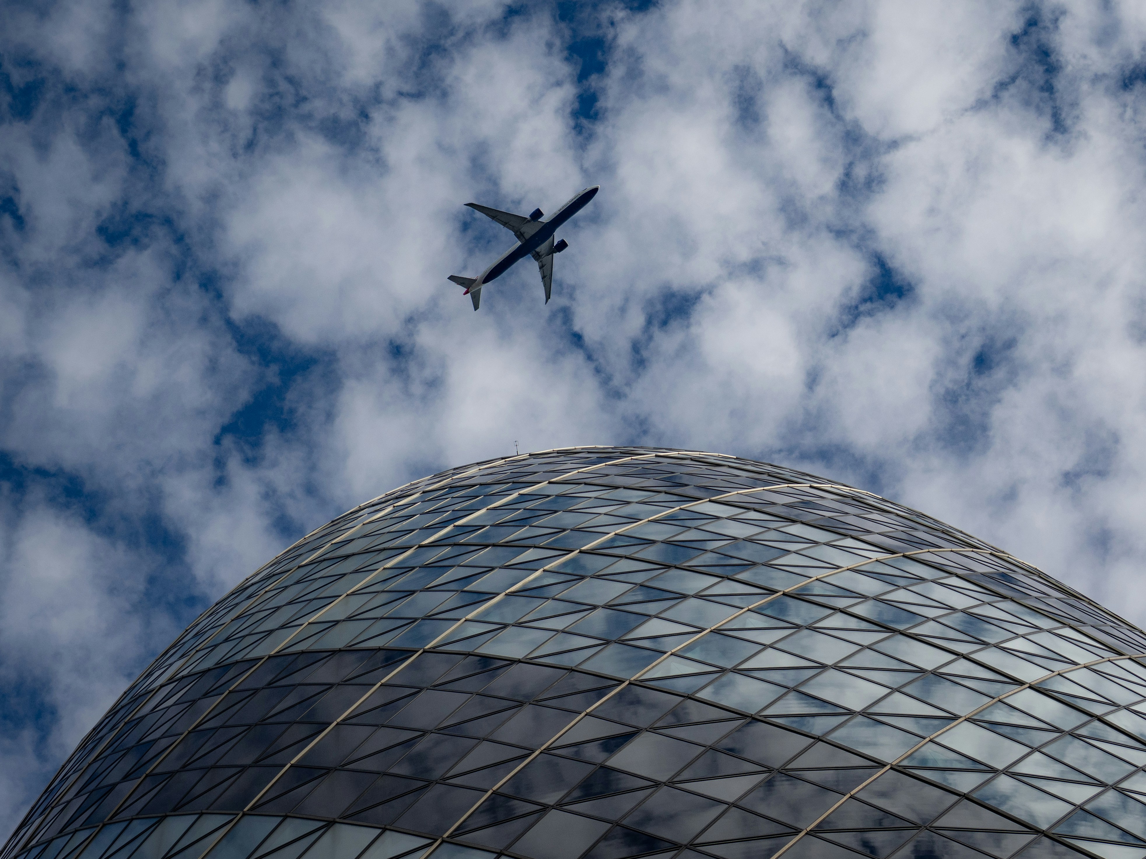 Plane Crossing Over a Geometric Glass Dome