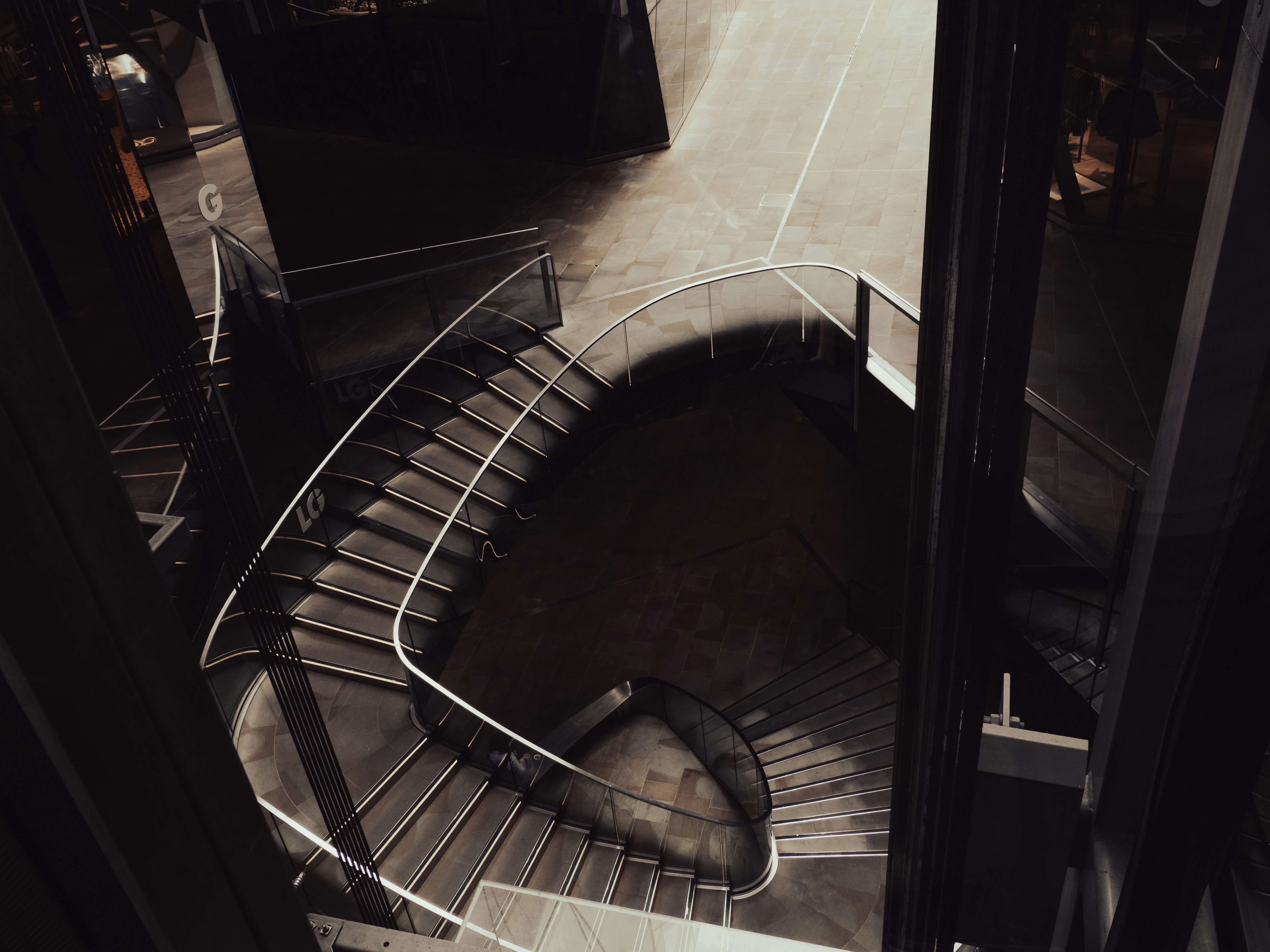 Spiral Descent: A Quiet Moment Inside the Atrium