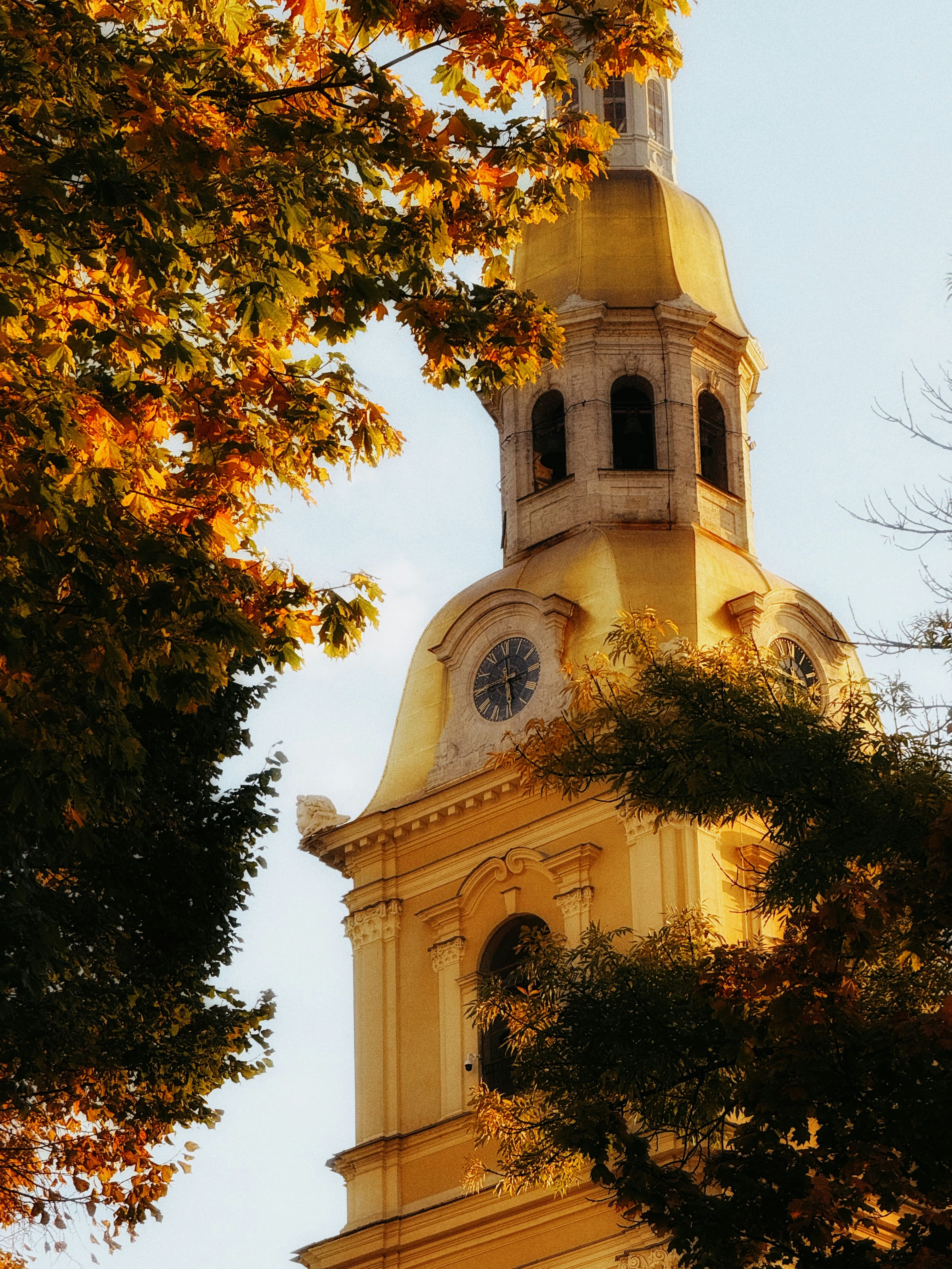 Golden Bell Turret Amid Autumn Canopy