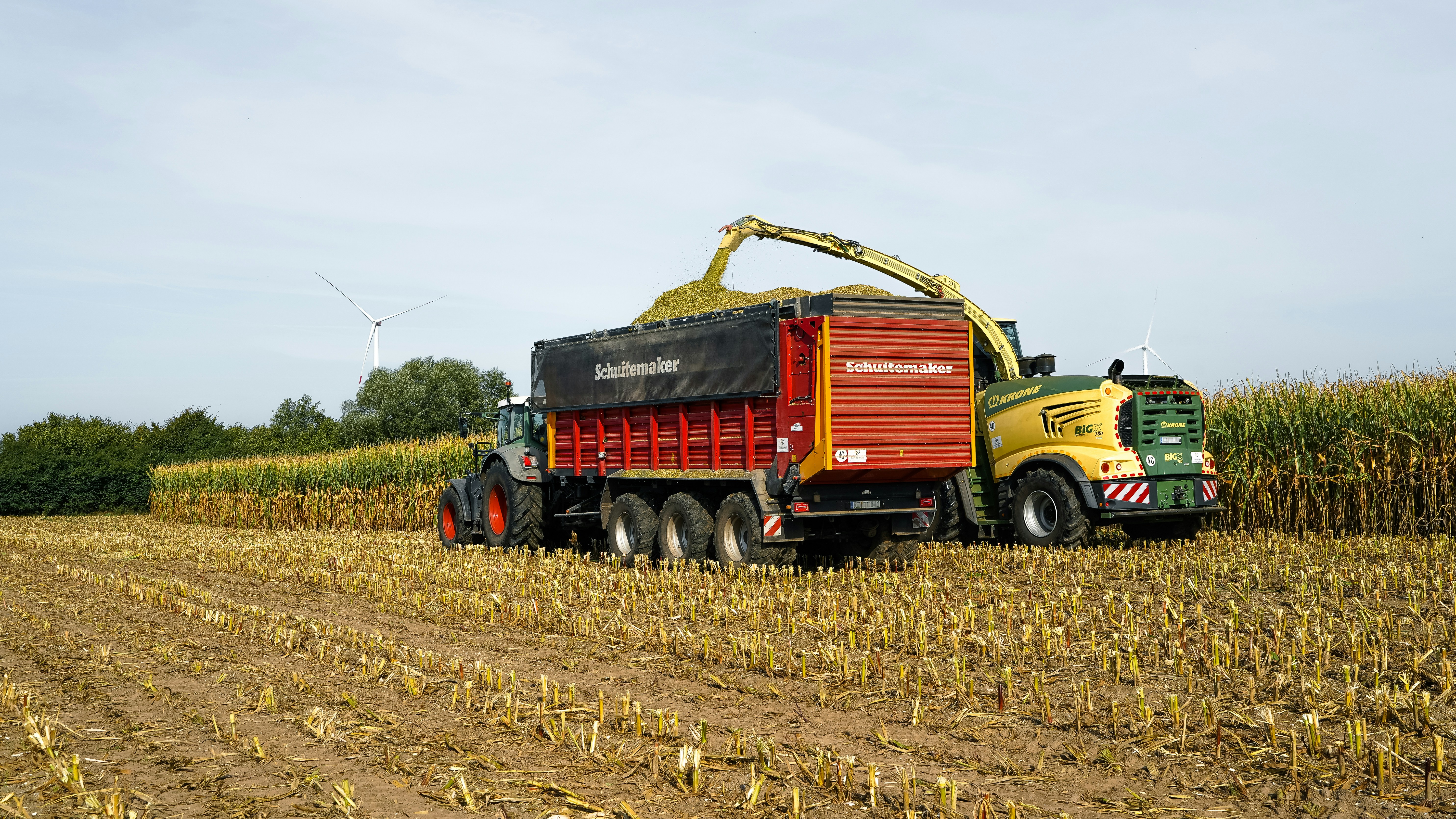 Harvester Mirage: A Tractor-Driven Harvest Scene Rests Amid Stubble