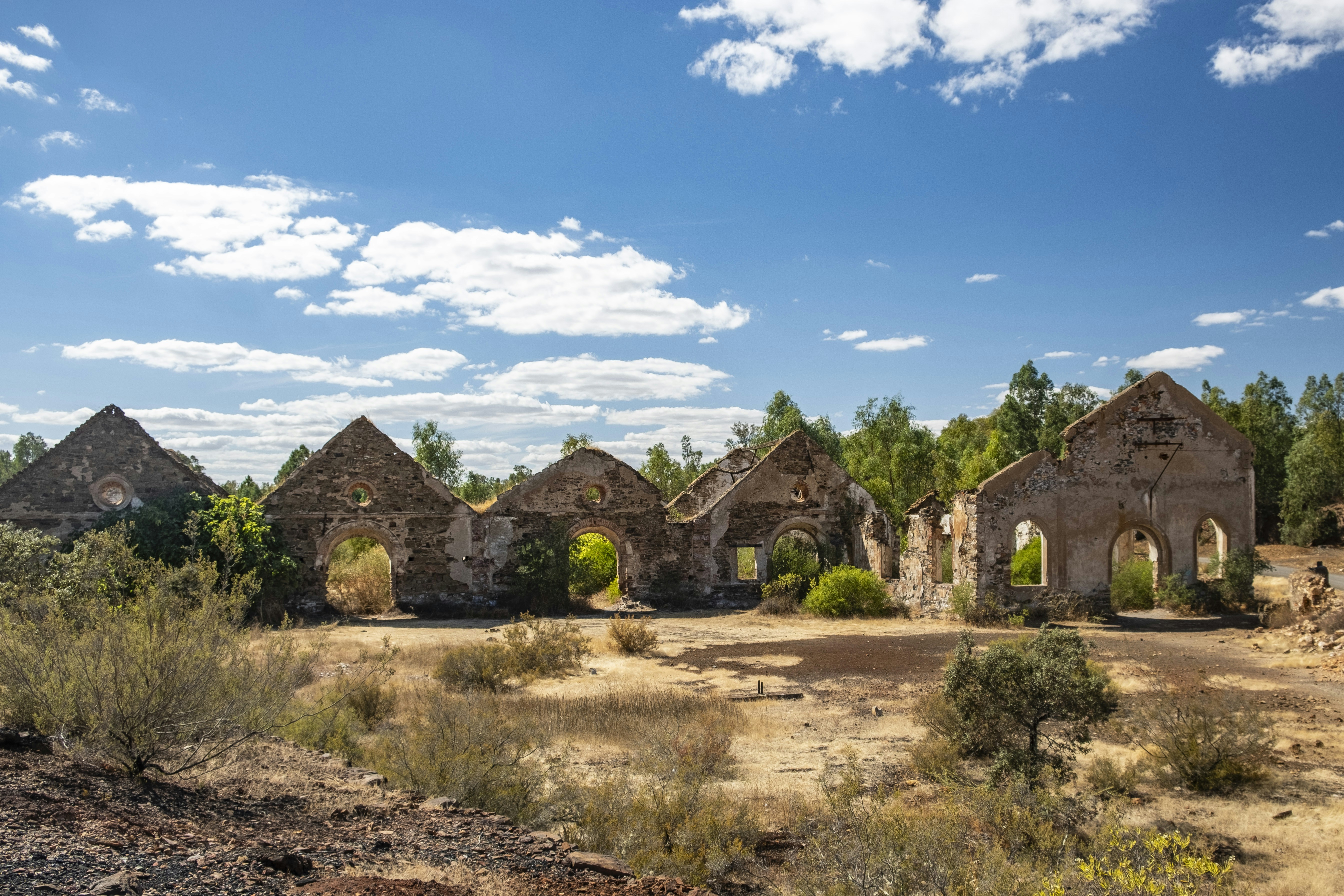 Ruins of a Deserted Stone Monastery under a Bright Sky