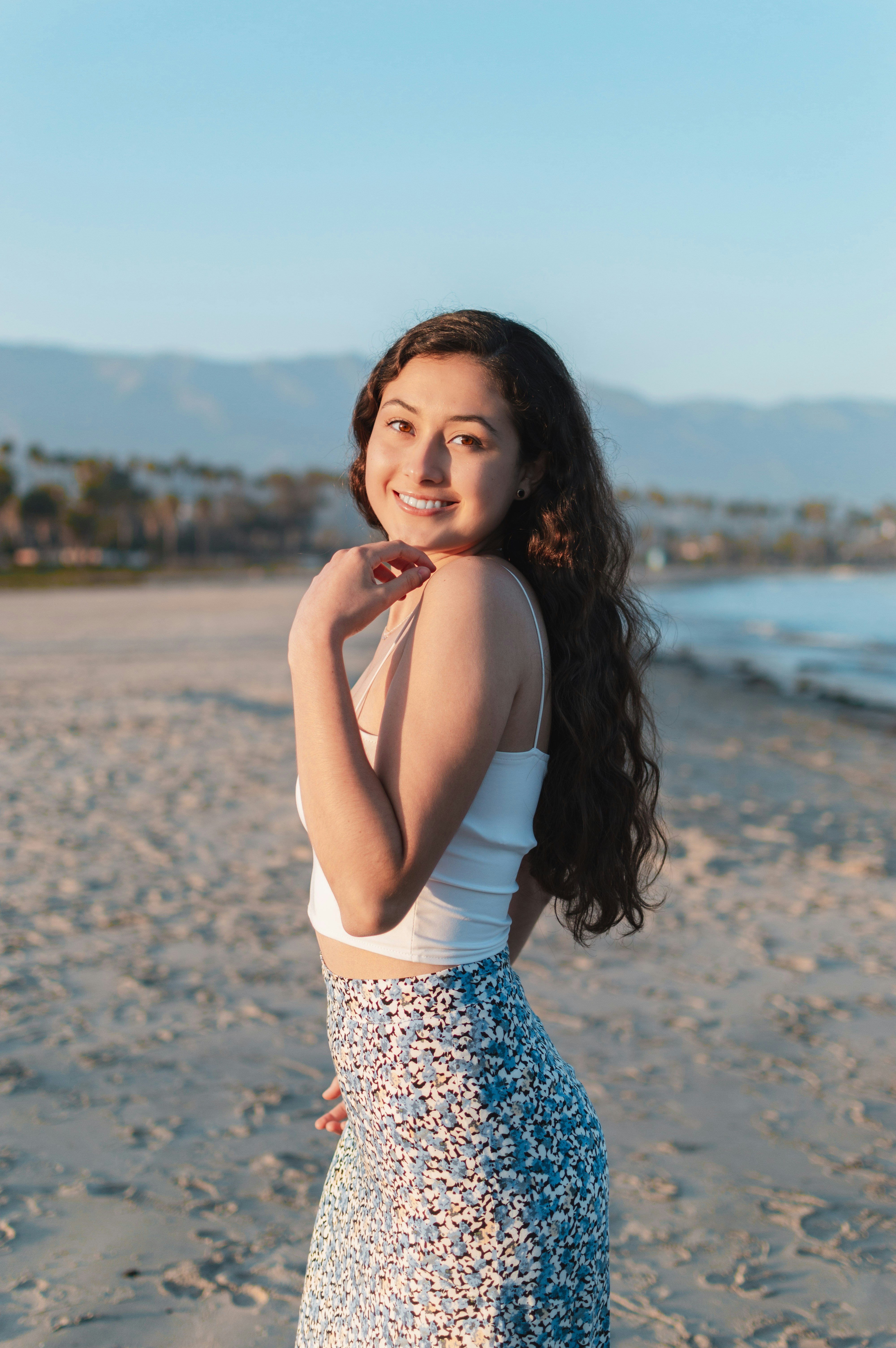 Sunlit Smile at the Shore: A Portrait on the Quiet Beach