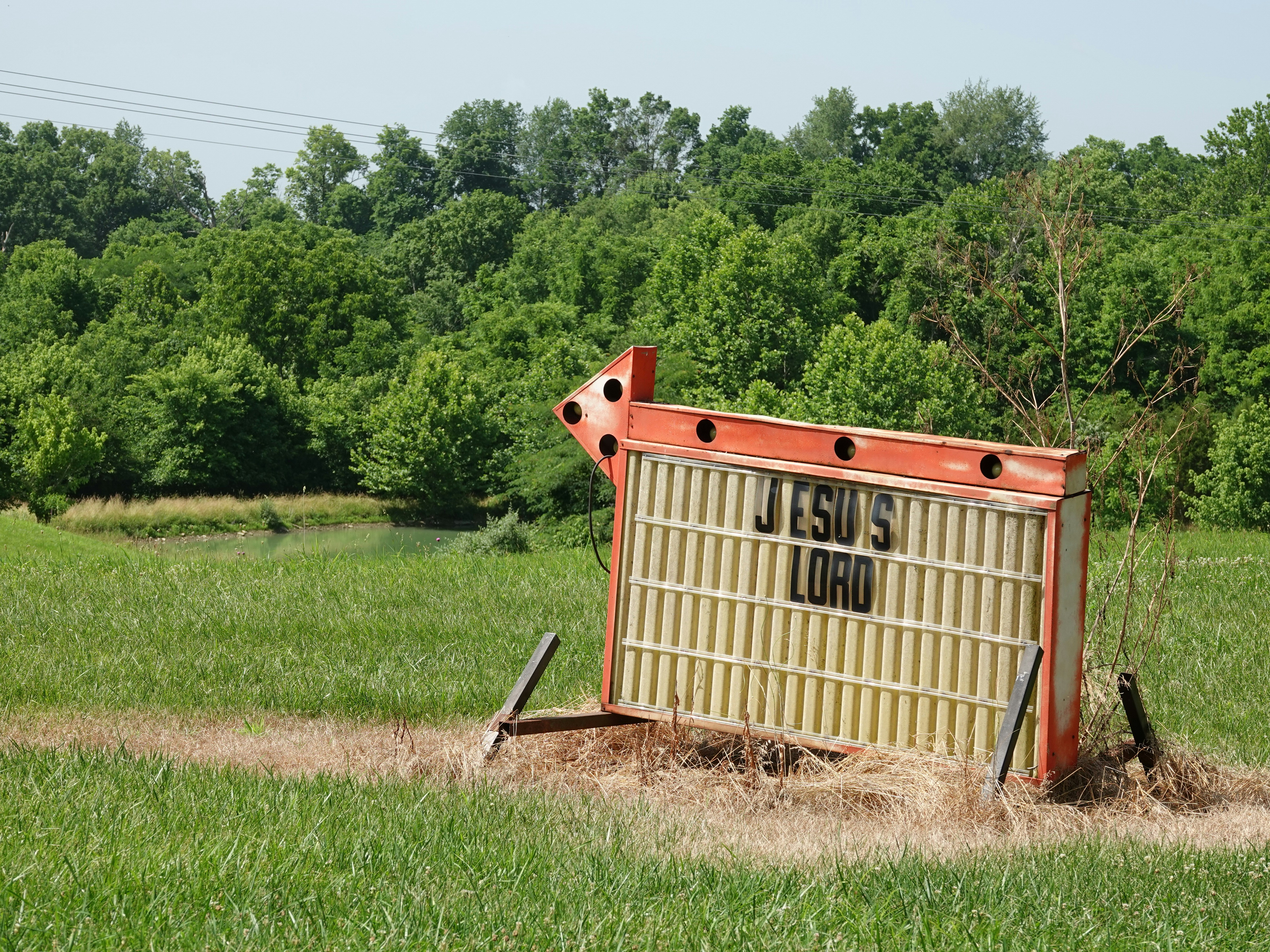 Relic Sign in a Quiet Field: Jesus Lord Remnant