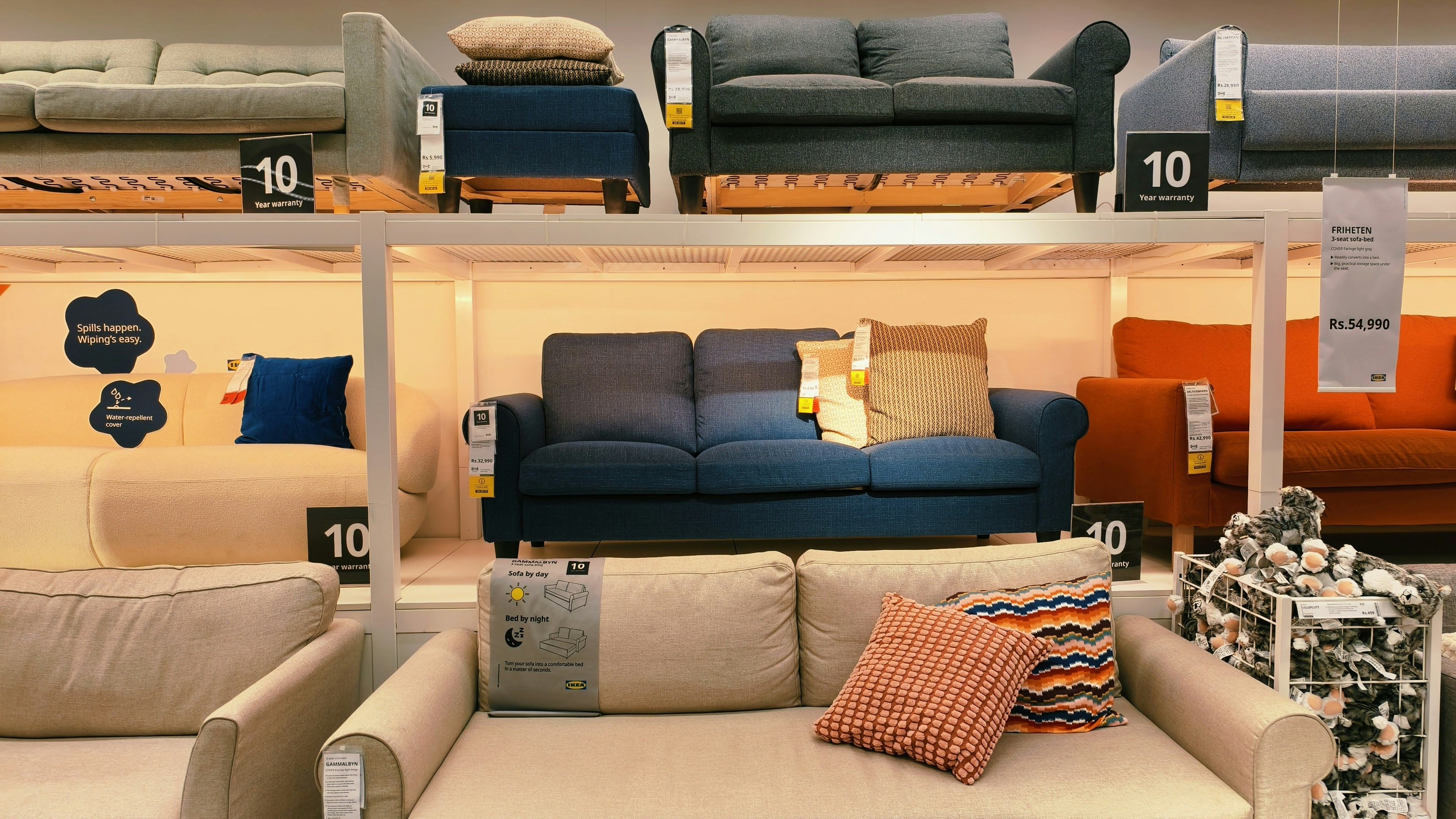 Sofa Parade: A Retail Aisle of Cushions and Neutrals