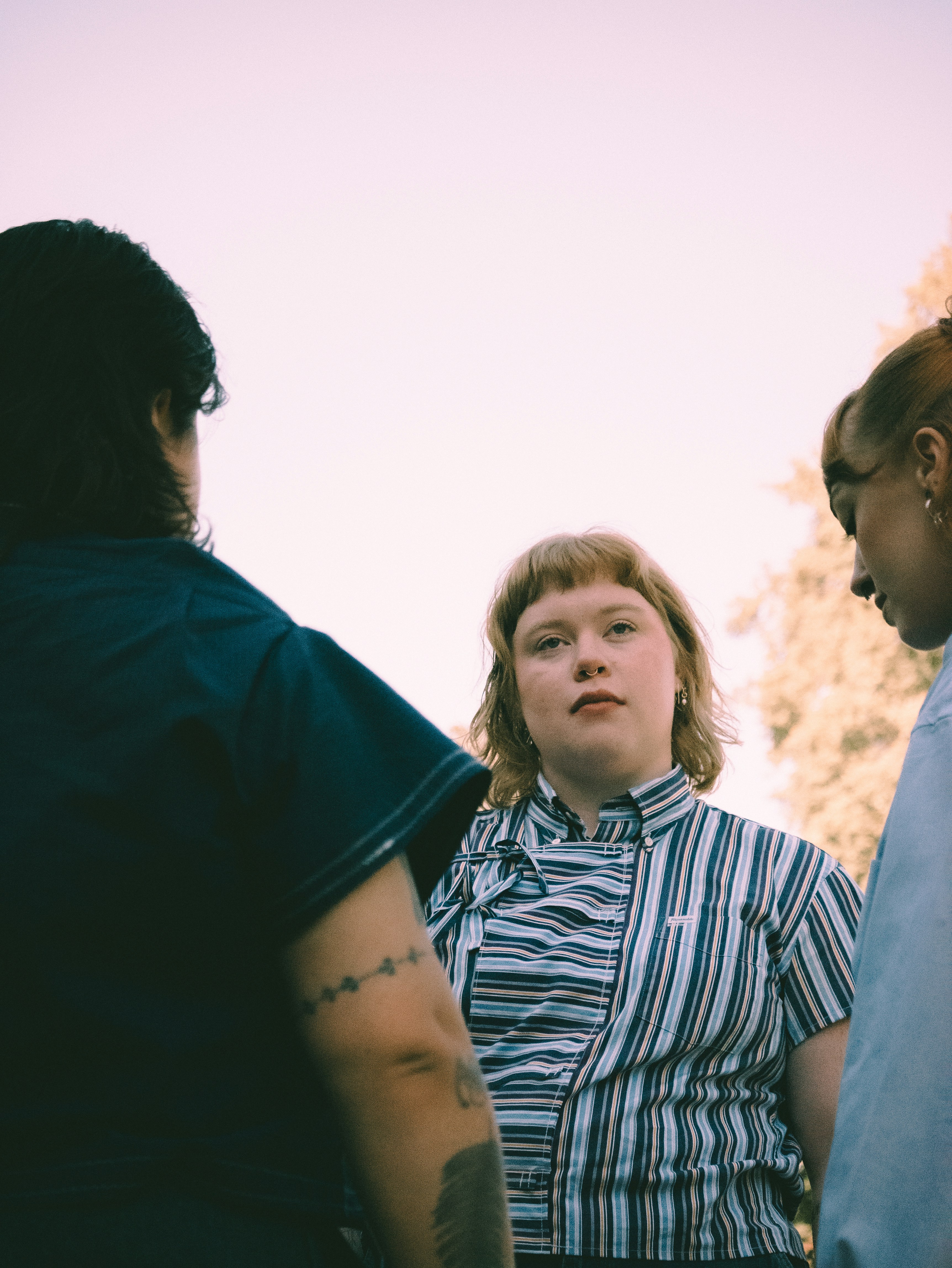 Center of Gravity: A Trio in Soft Backlight