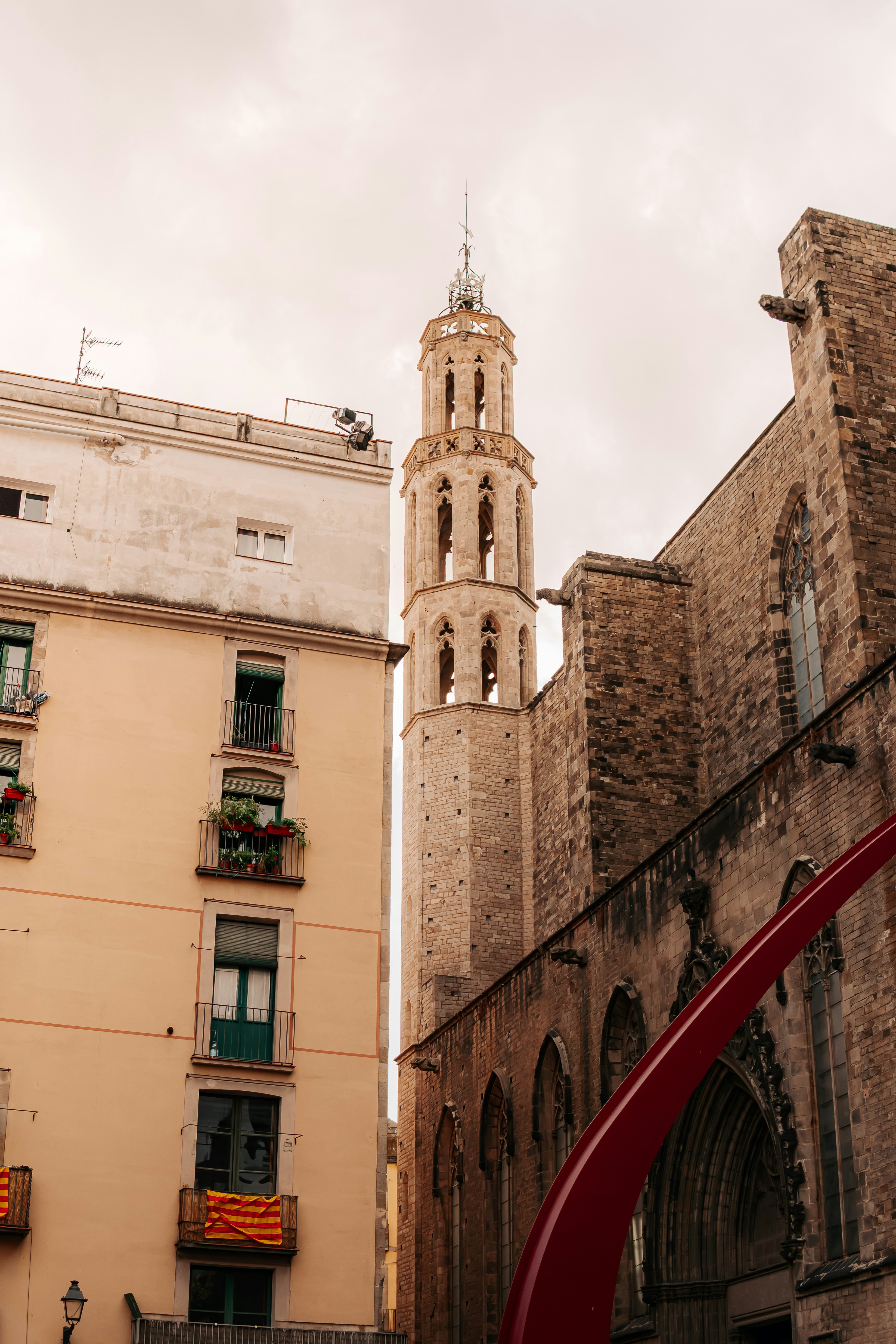 Bell Tower Silhouette Above a European Street