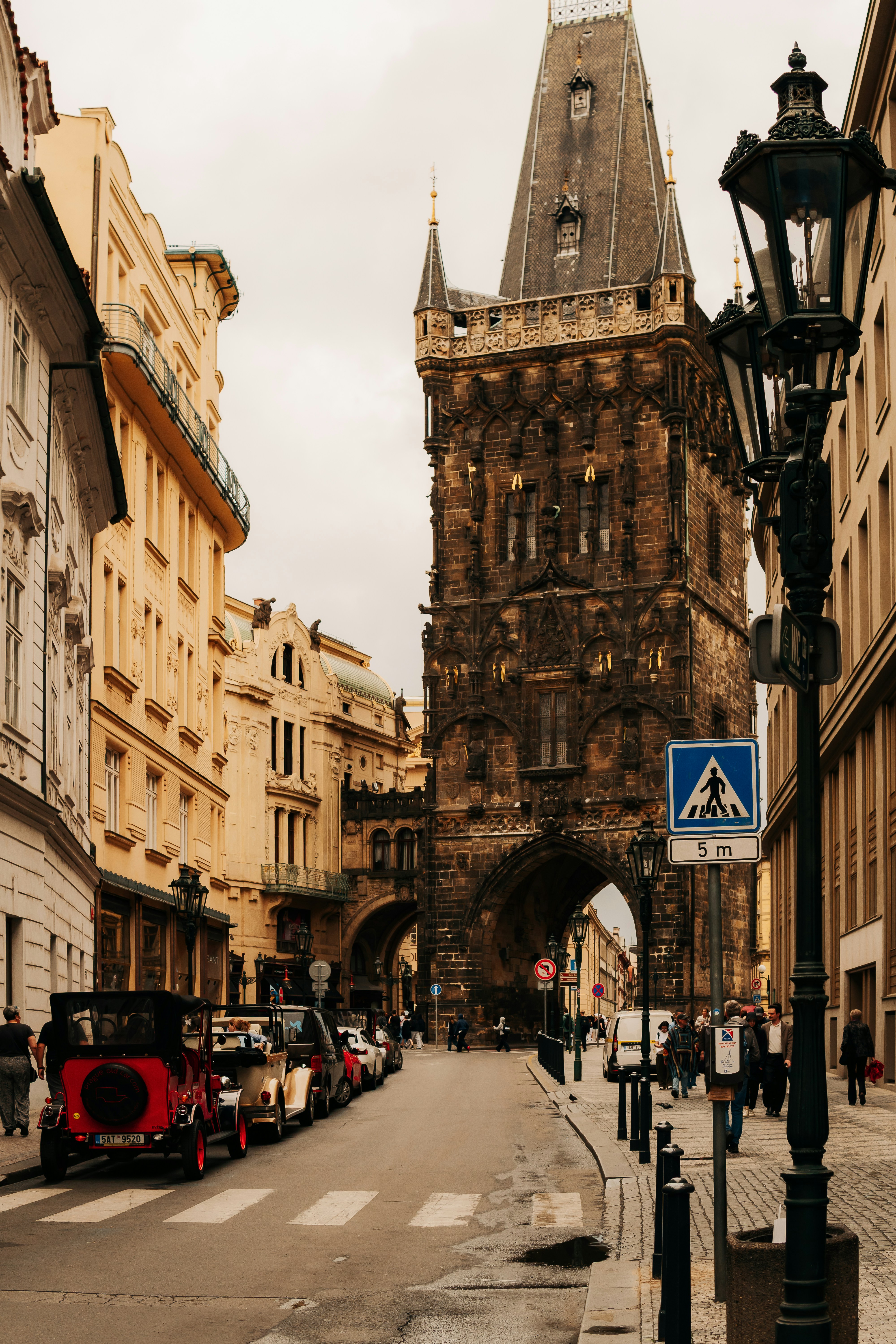 Tower Bridge in Prague: The Old Town Archway Framed by Street Life