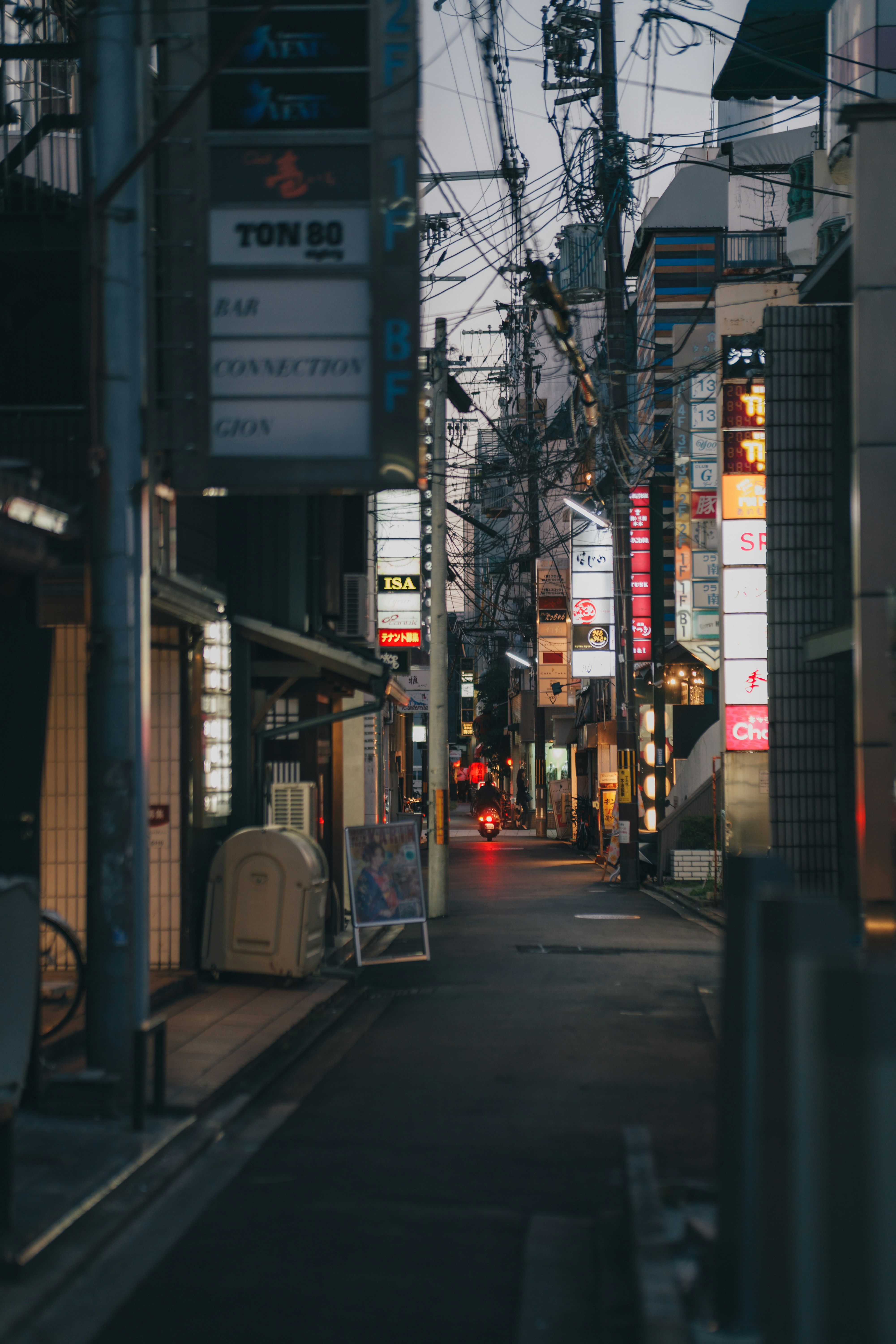 Neon Corridor: A Quiet Night Through a Bustling Street