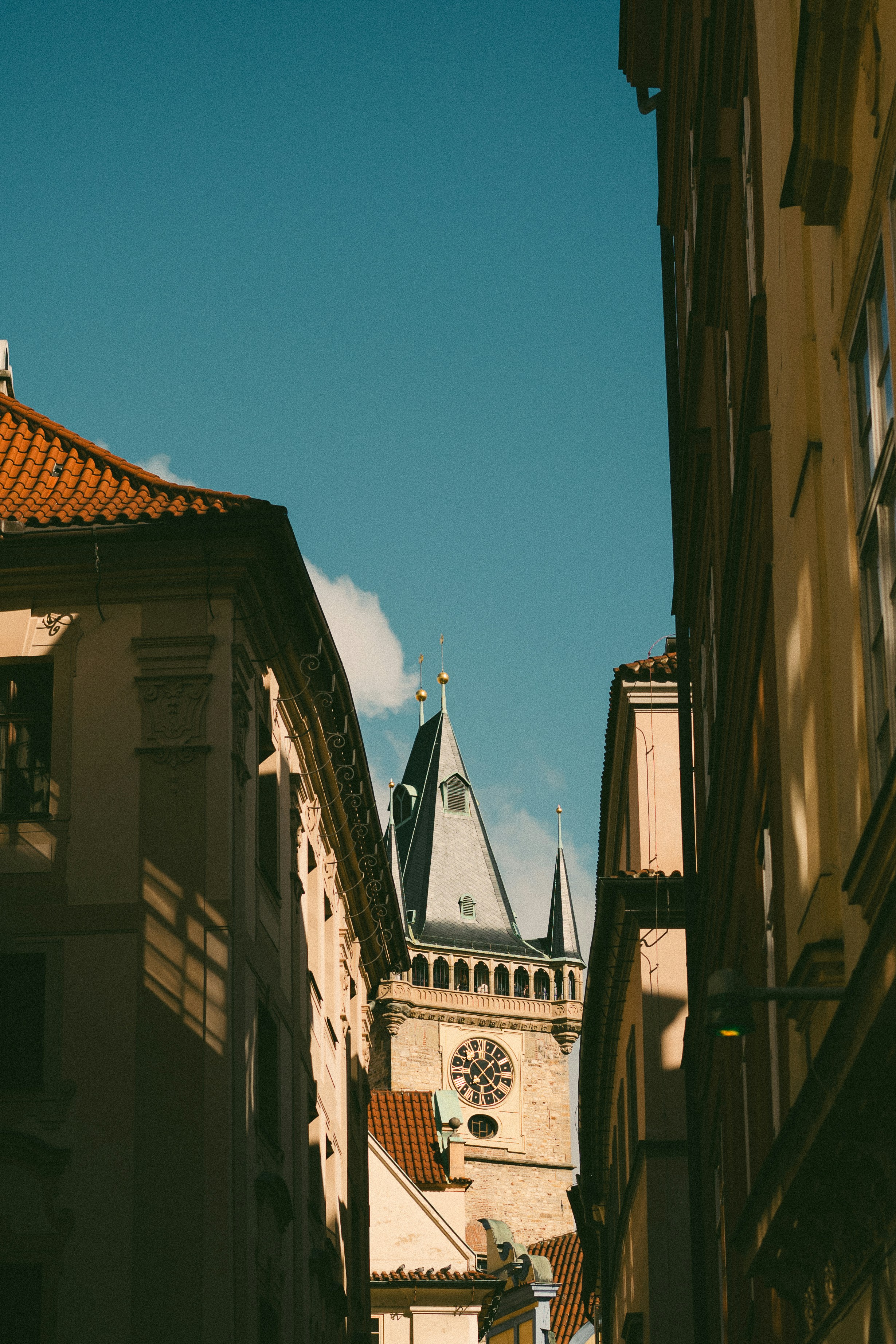 Clock Tower through the Narrow Canyon of Buildings
