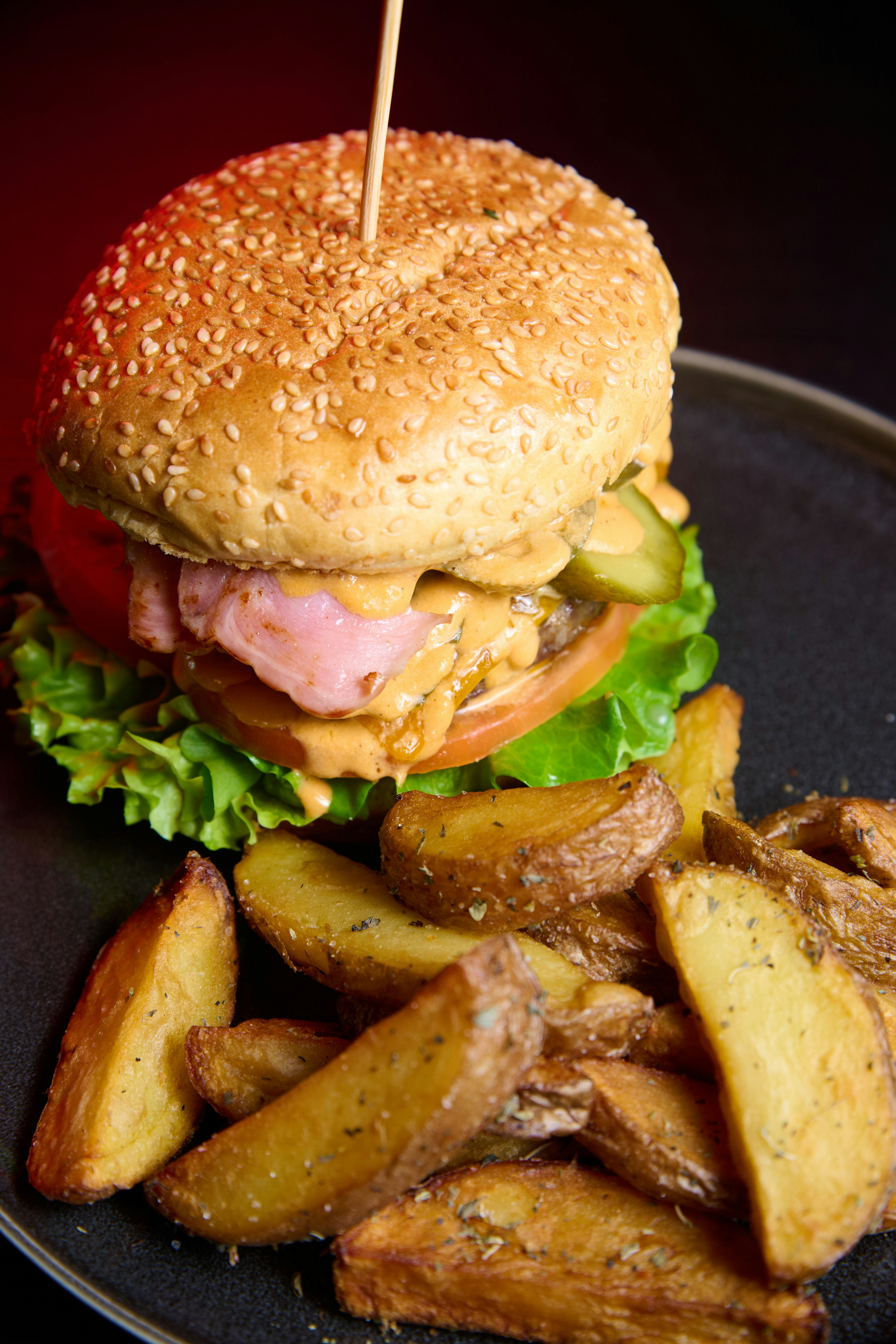 Burger Crown: A sesame-shelled hero perched above golden wedges