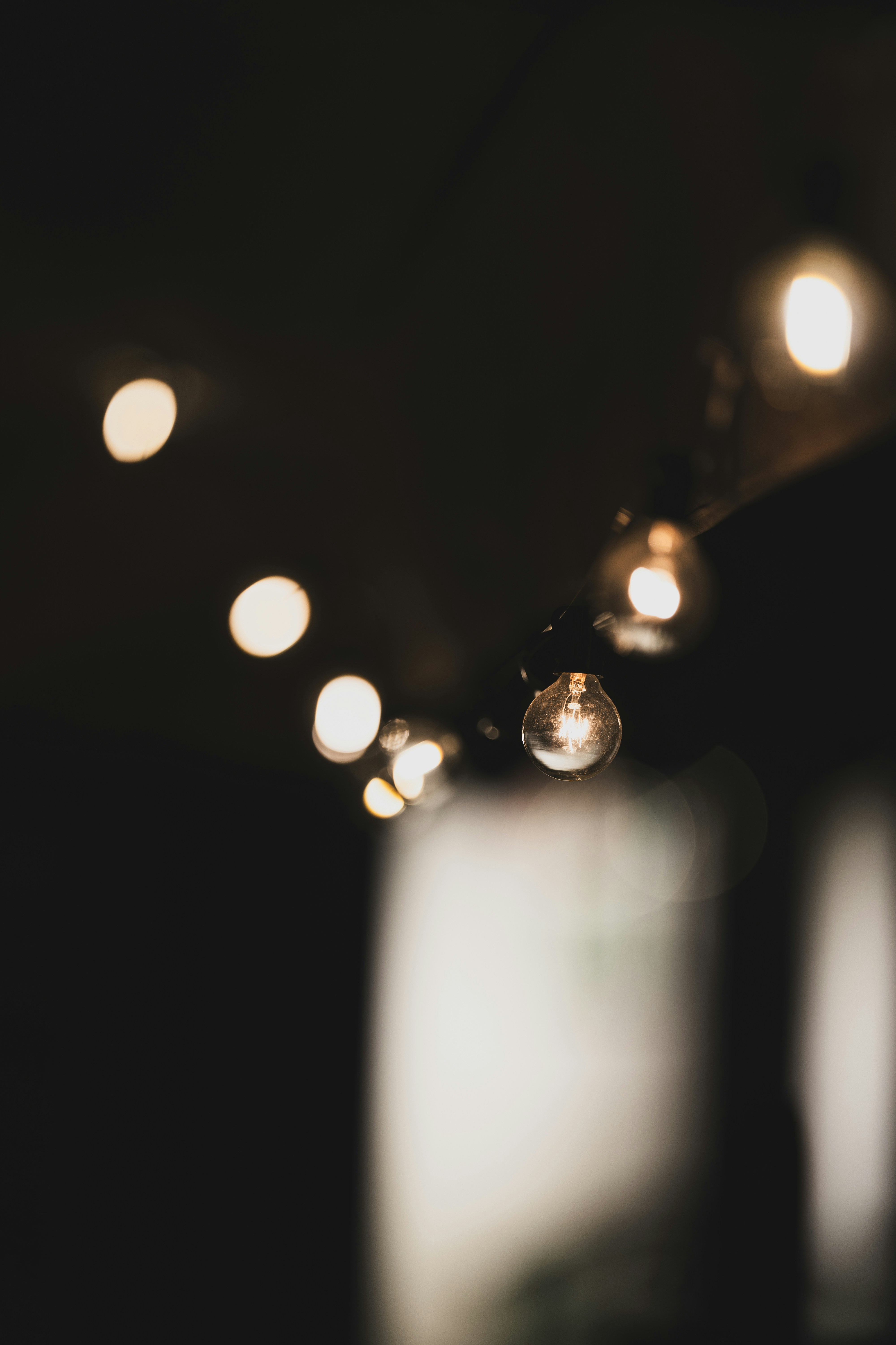 Bokeh of Warm Fairylights in Dim Backdrop