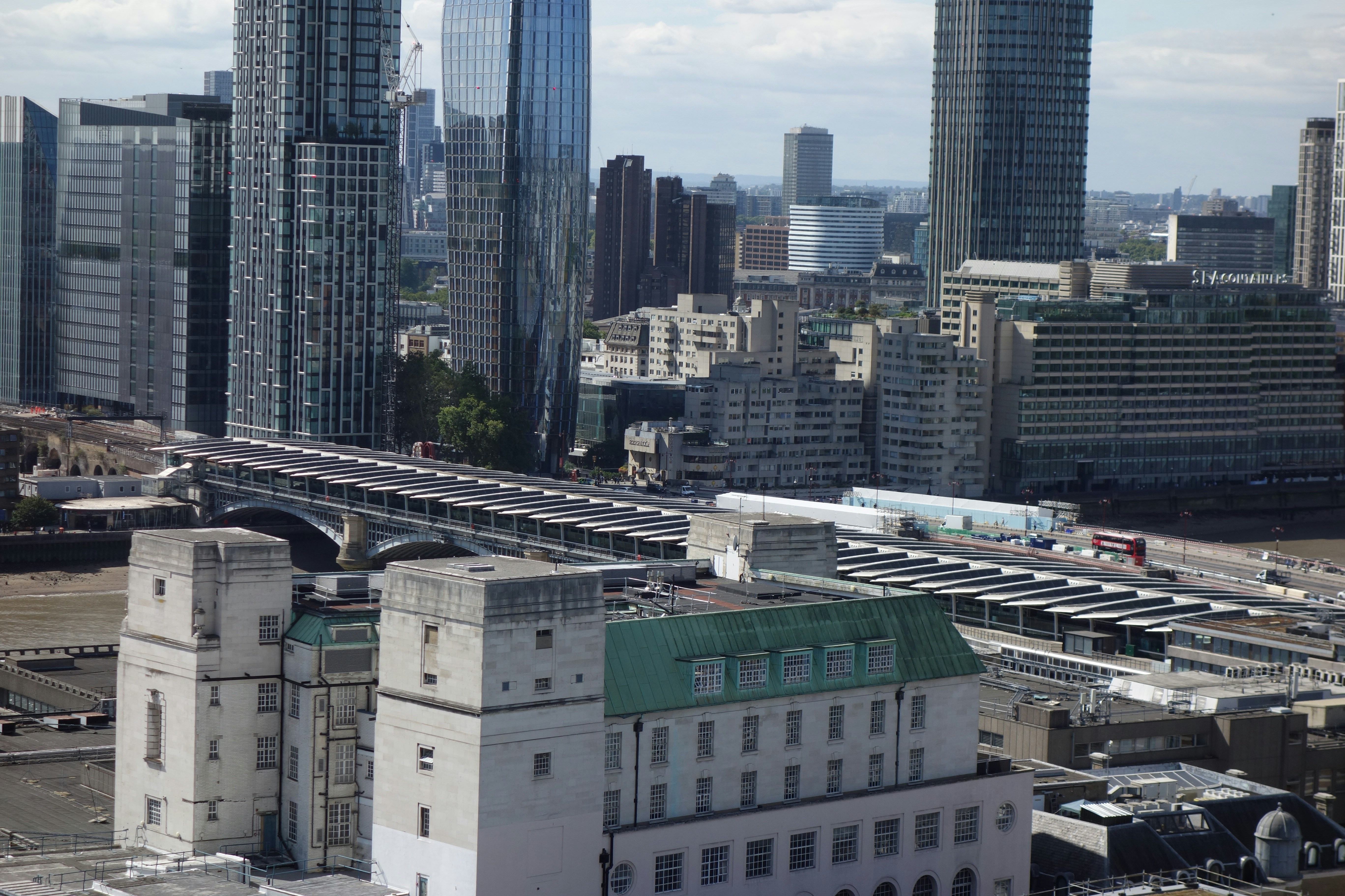 Railway Overpass Framing a Modern Cityscape