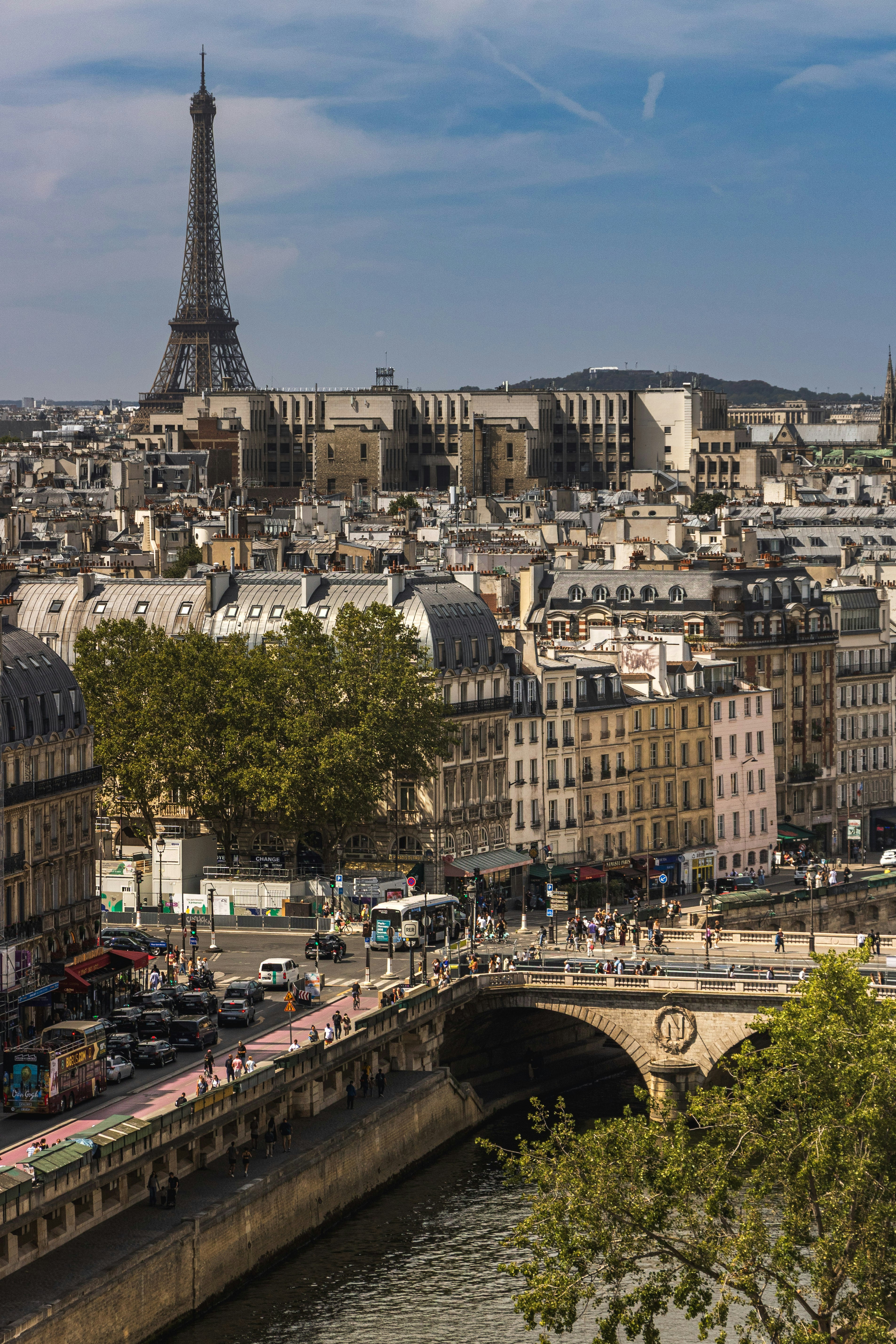 Parisian Panorama: The Eiffel Tower Guiding the Flowing Riverbank