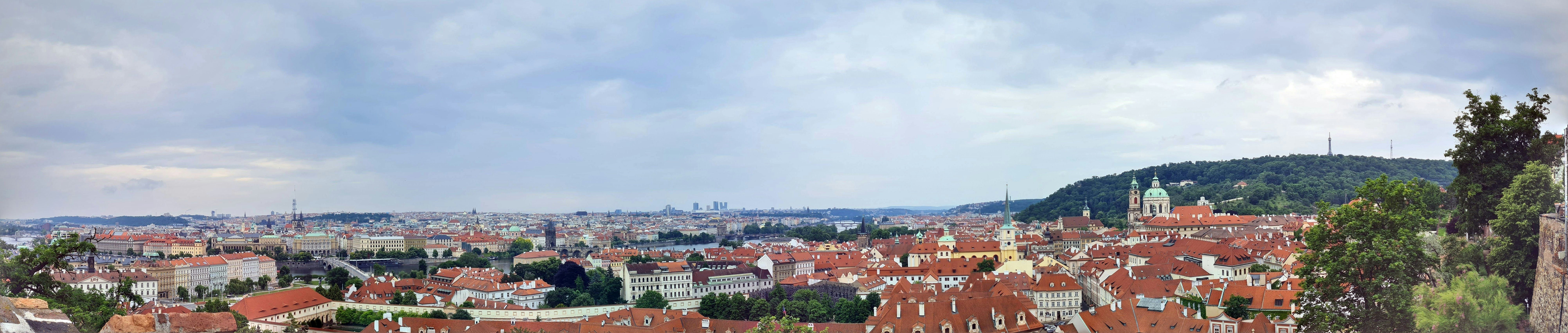 Rooftop Cadence: A Panoramic Overlook of a Historic European City