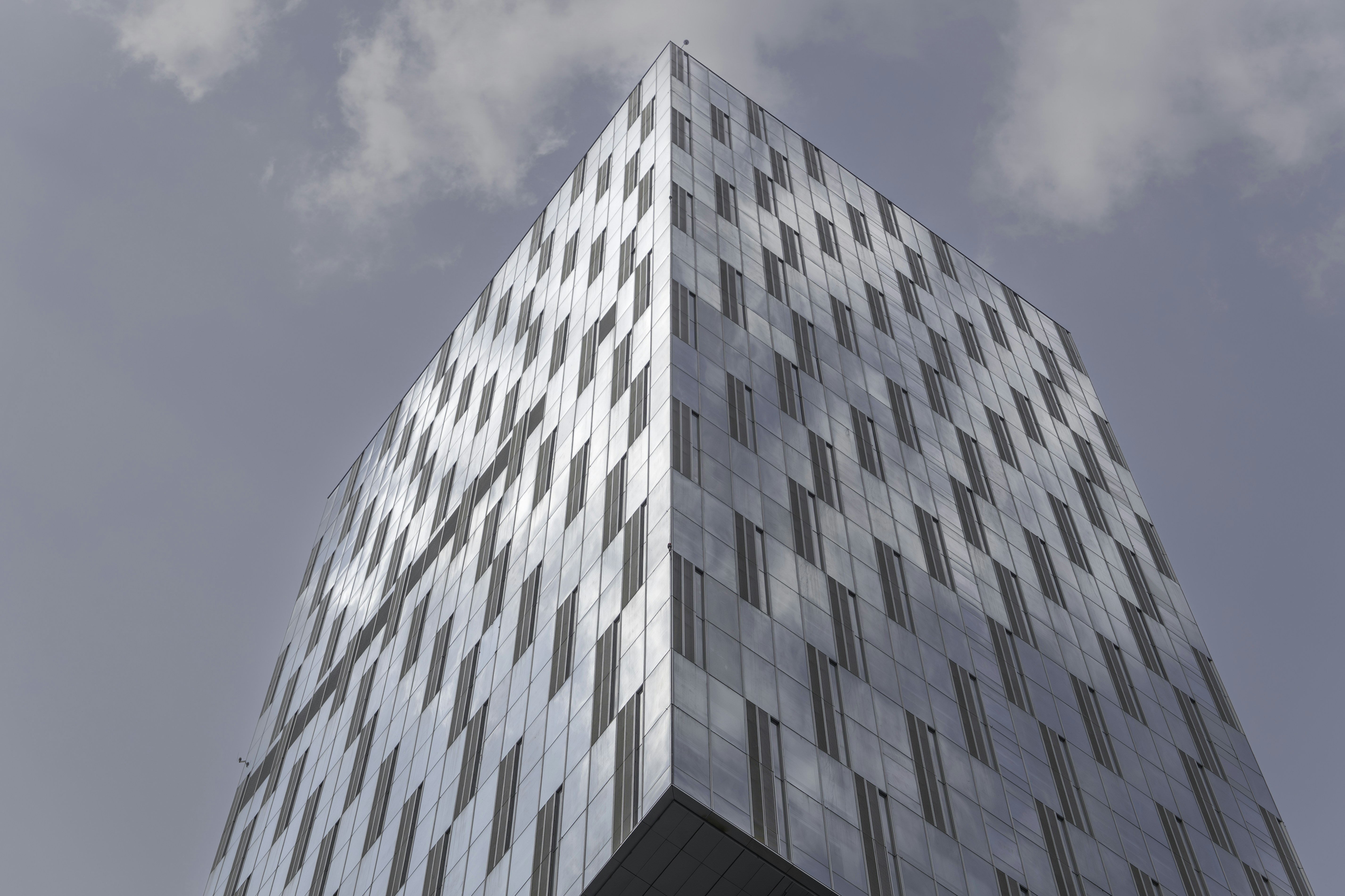 Angle of Glass: The Faceted Peak of a Modern Tower