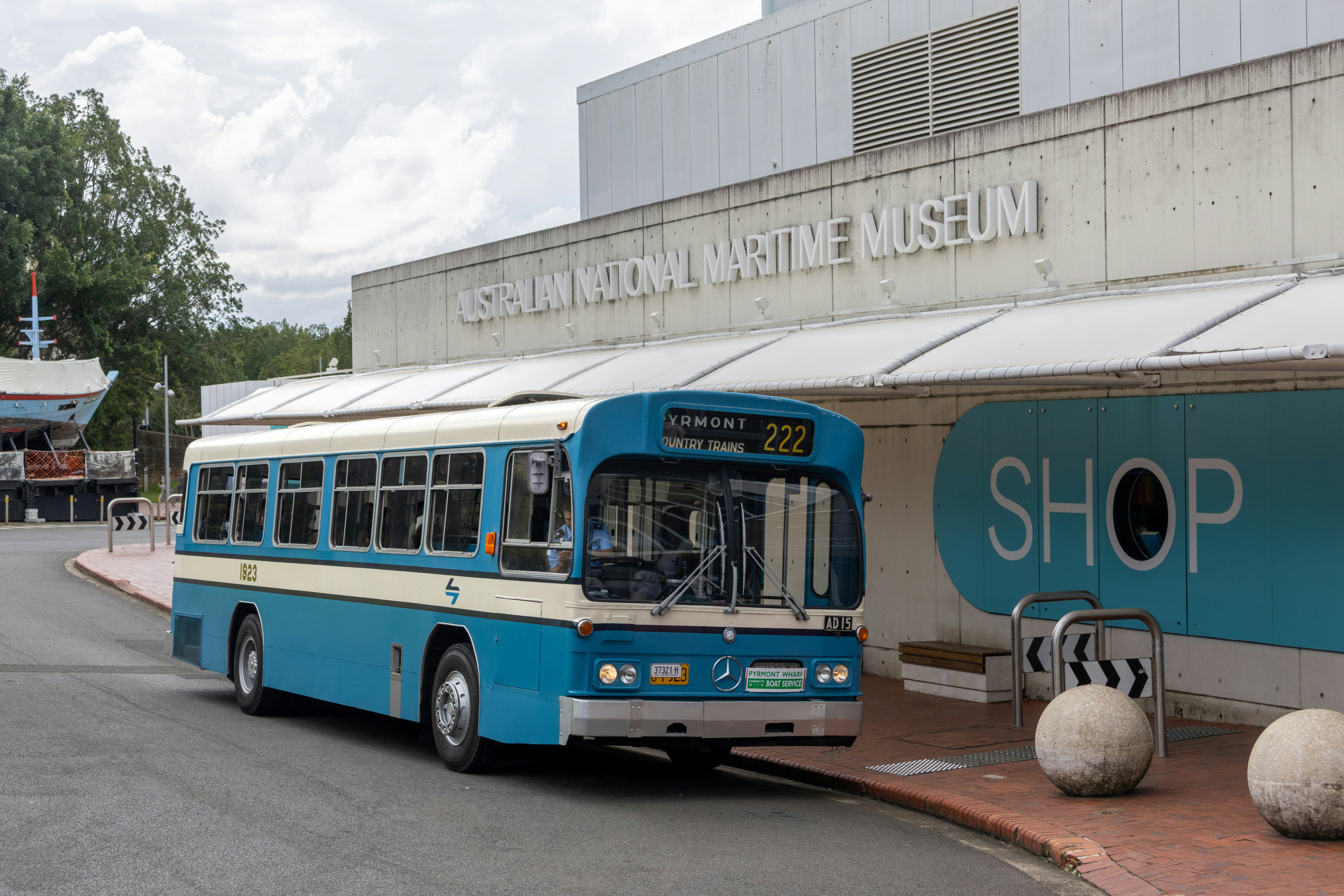 Mid-Century Blue Bus Near the Maritime Museum
