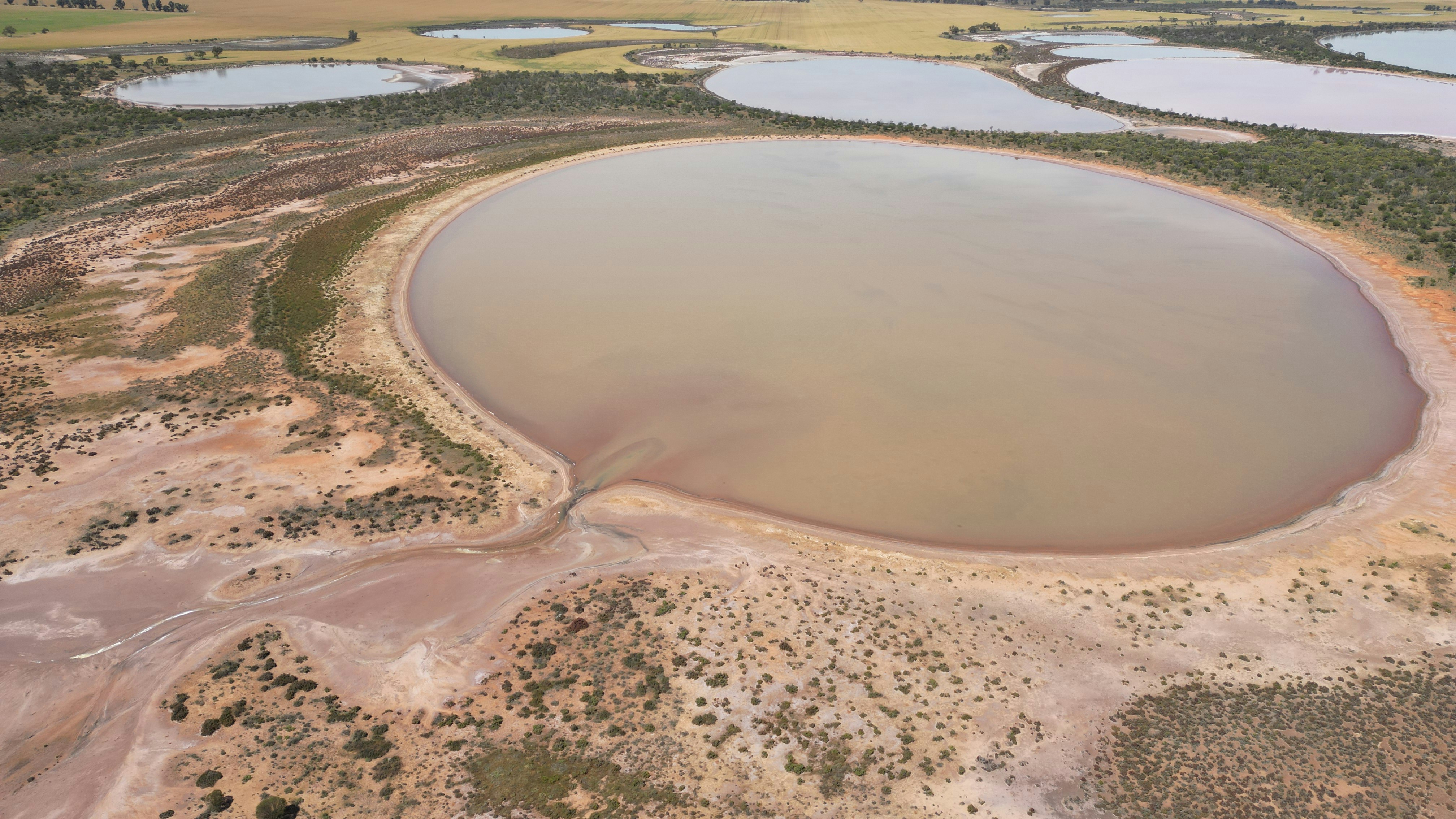 Circular Salt Pond Amid Arid Coastline