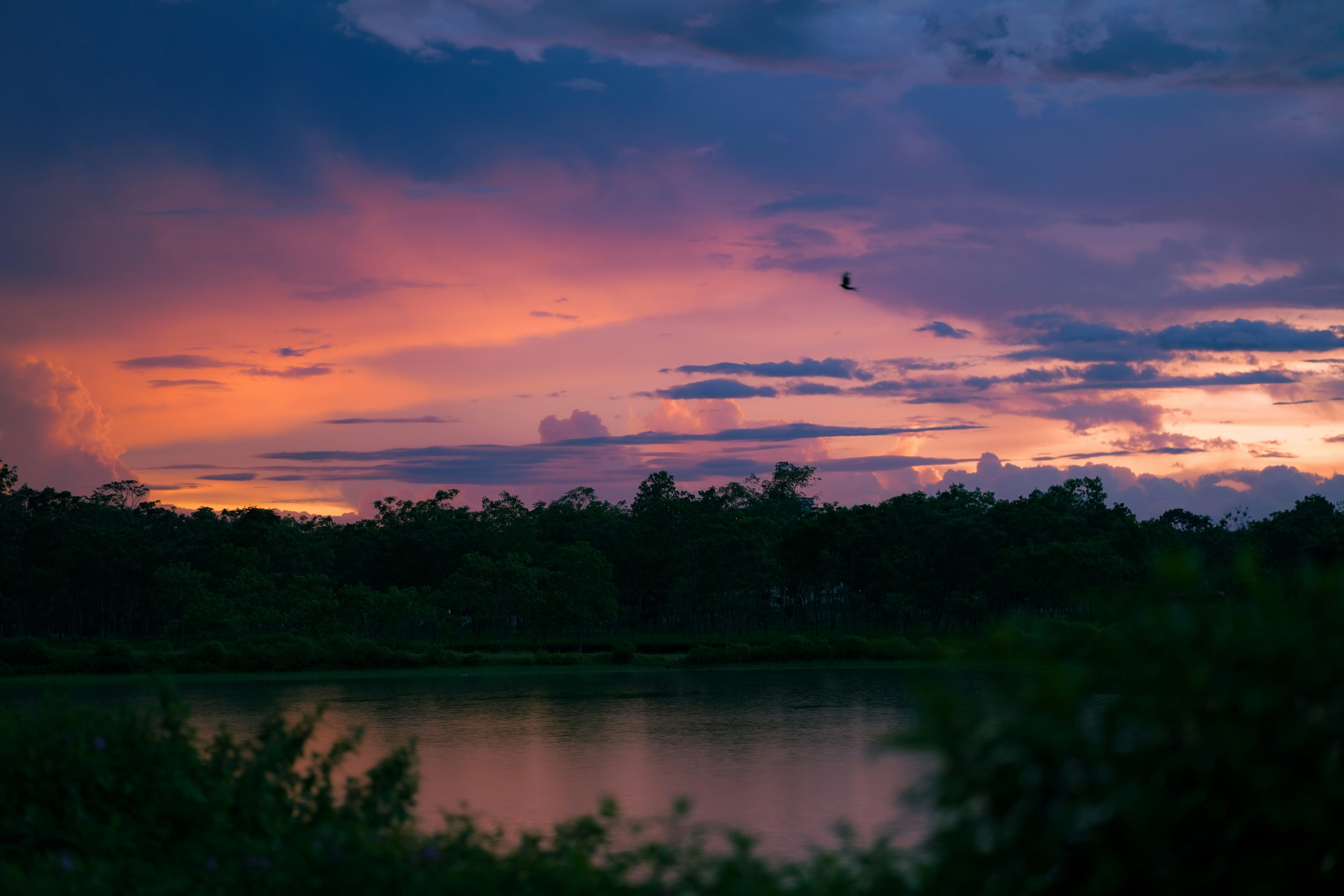 Crimson Sky Over Quiet Lakeside