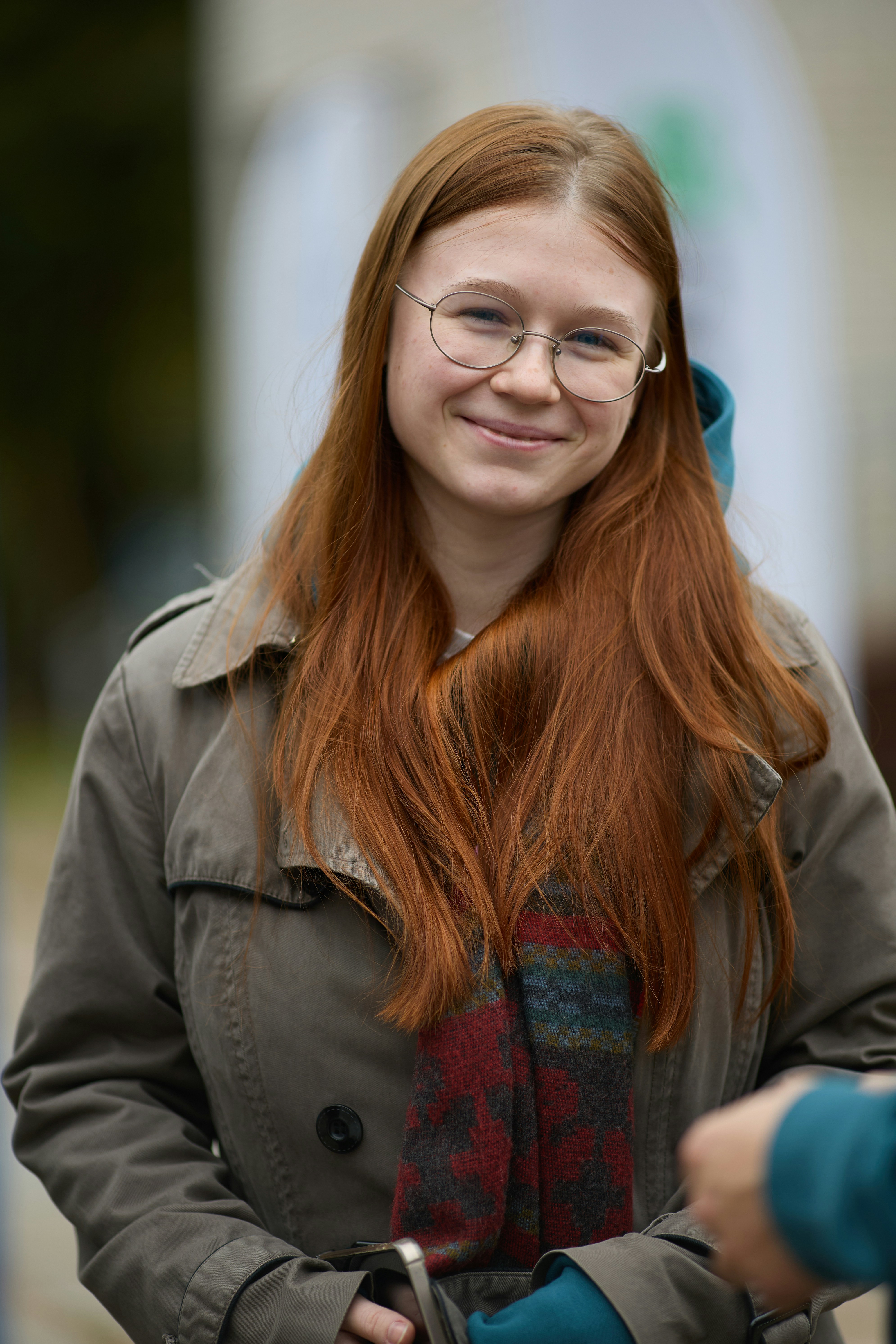 Red-Haired Smile and Glasses: Portrait in Soft Focus
