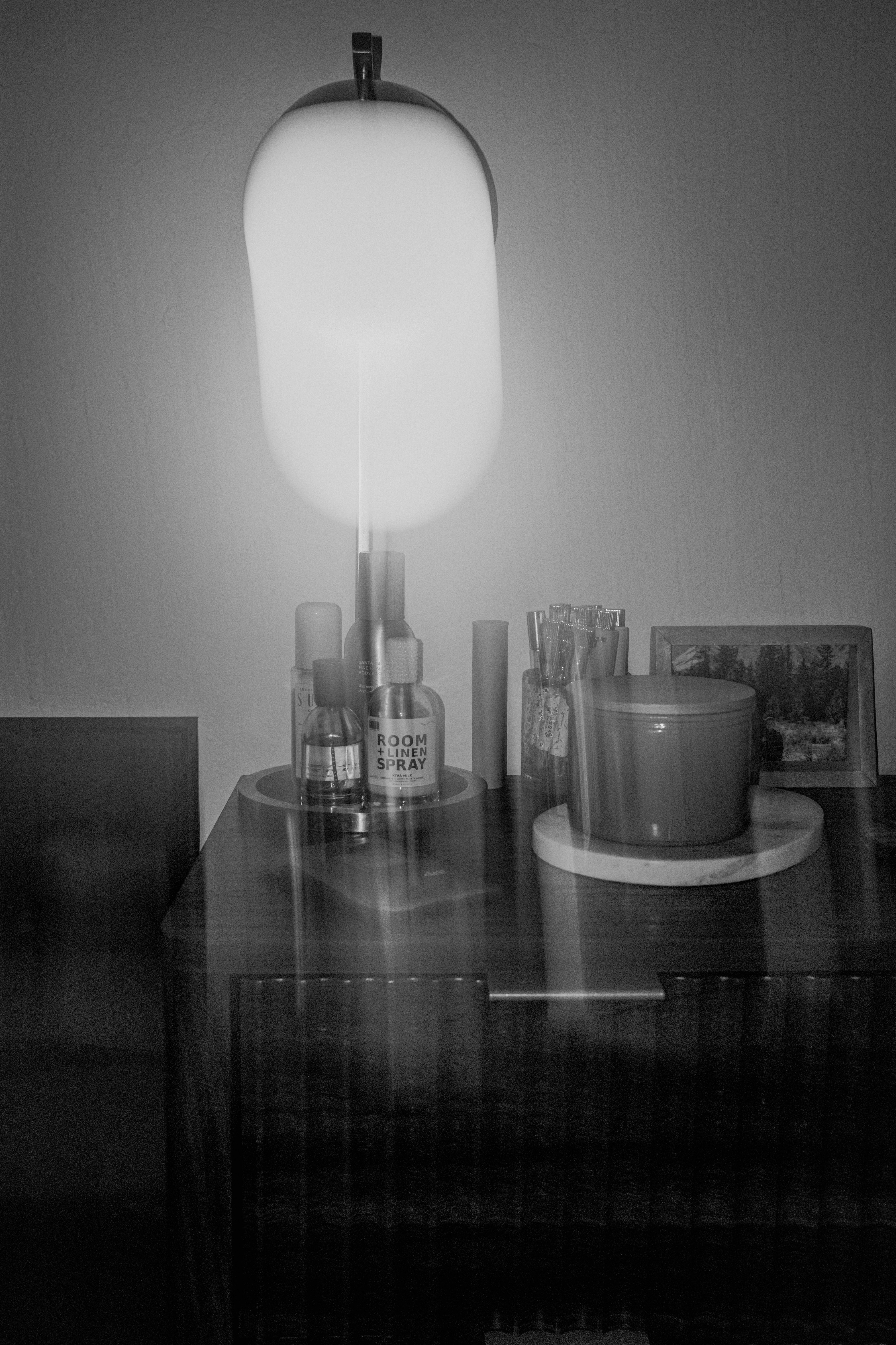 Soft Glow in a Quiet Vanity: A Nightstand Still Life