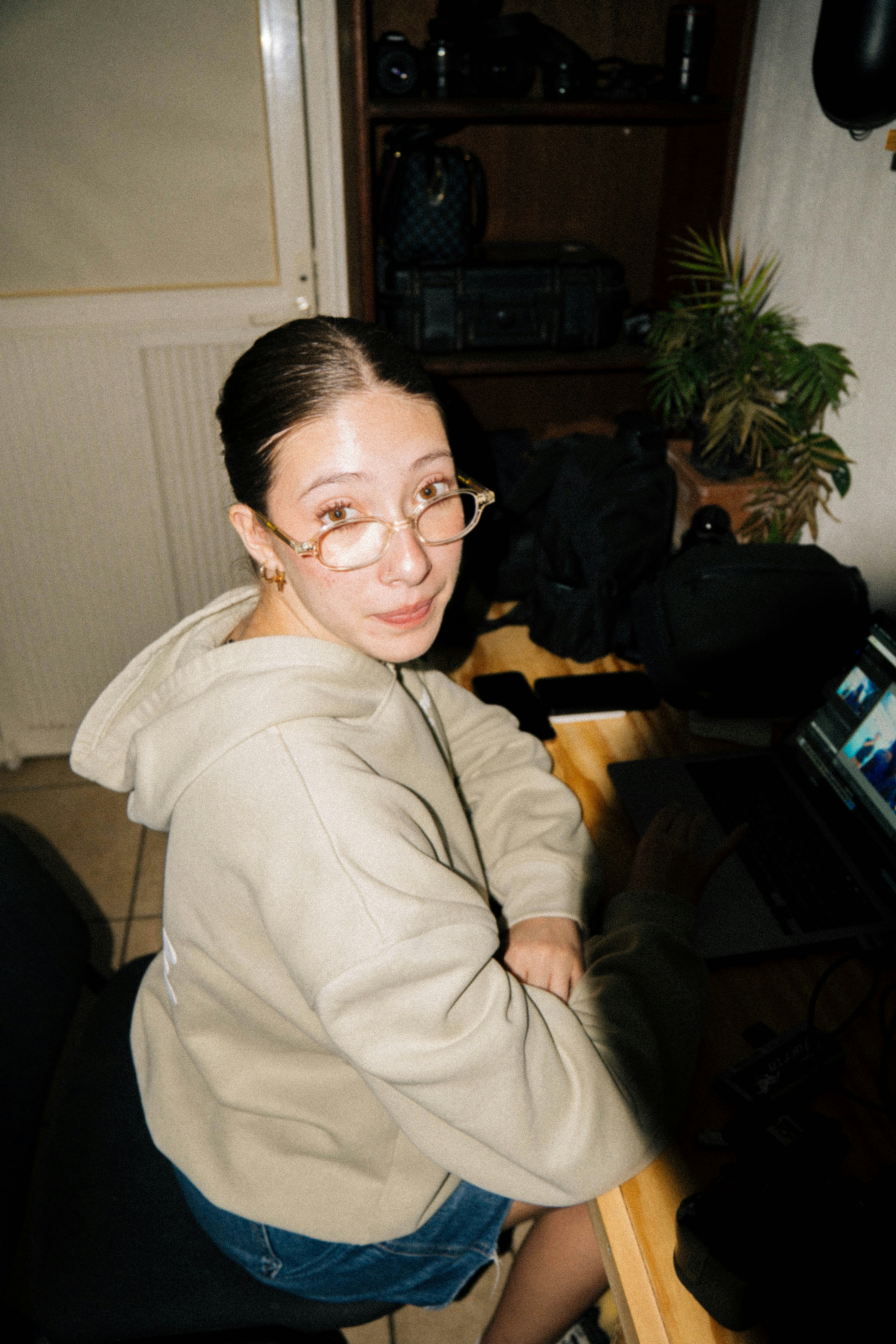 Glasses and Focus: A Quiet Moment at the Desk