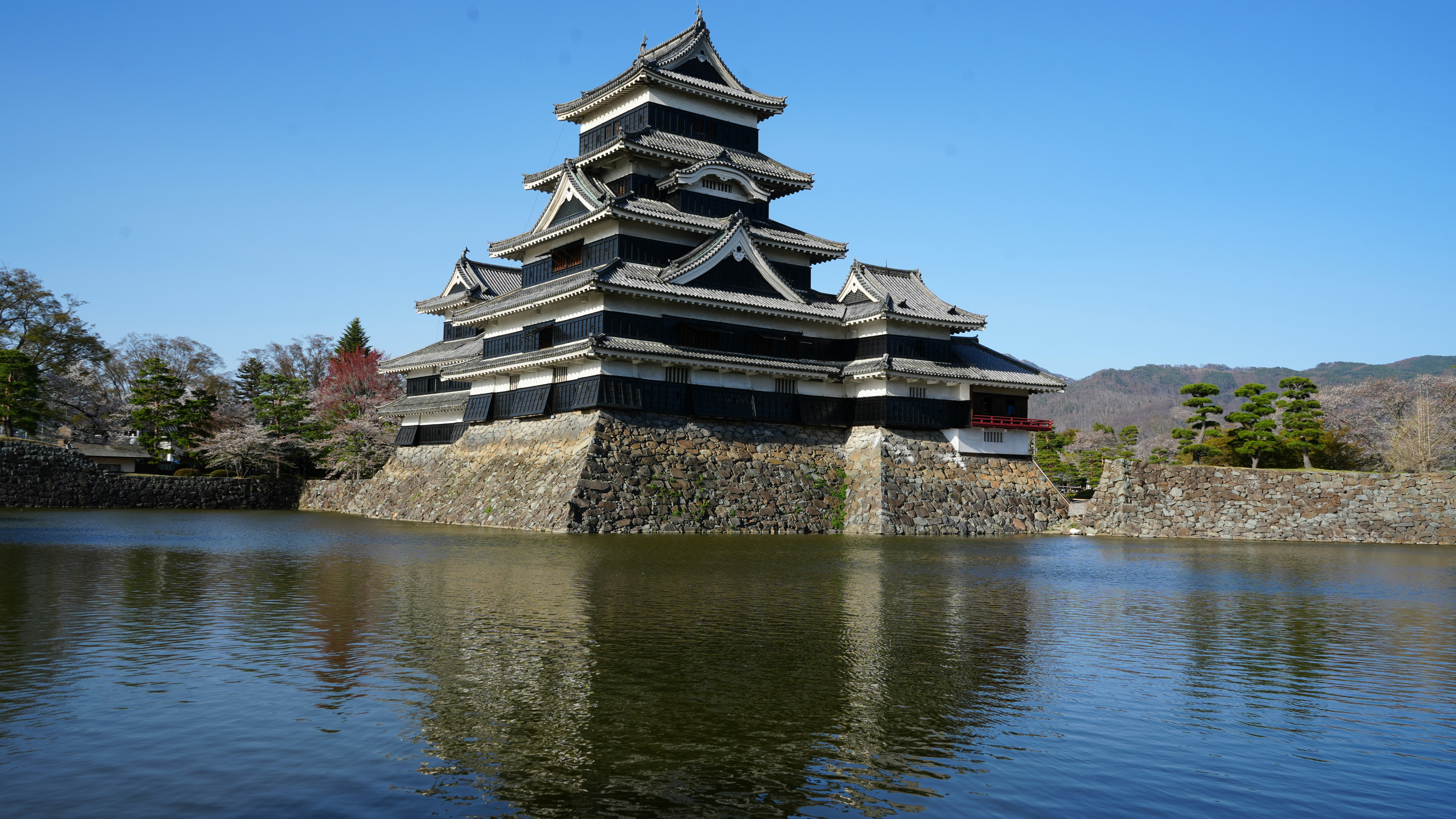 Echoes of the Castle: A Pagoda Rising from the Quiet Waters