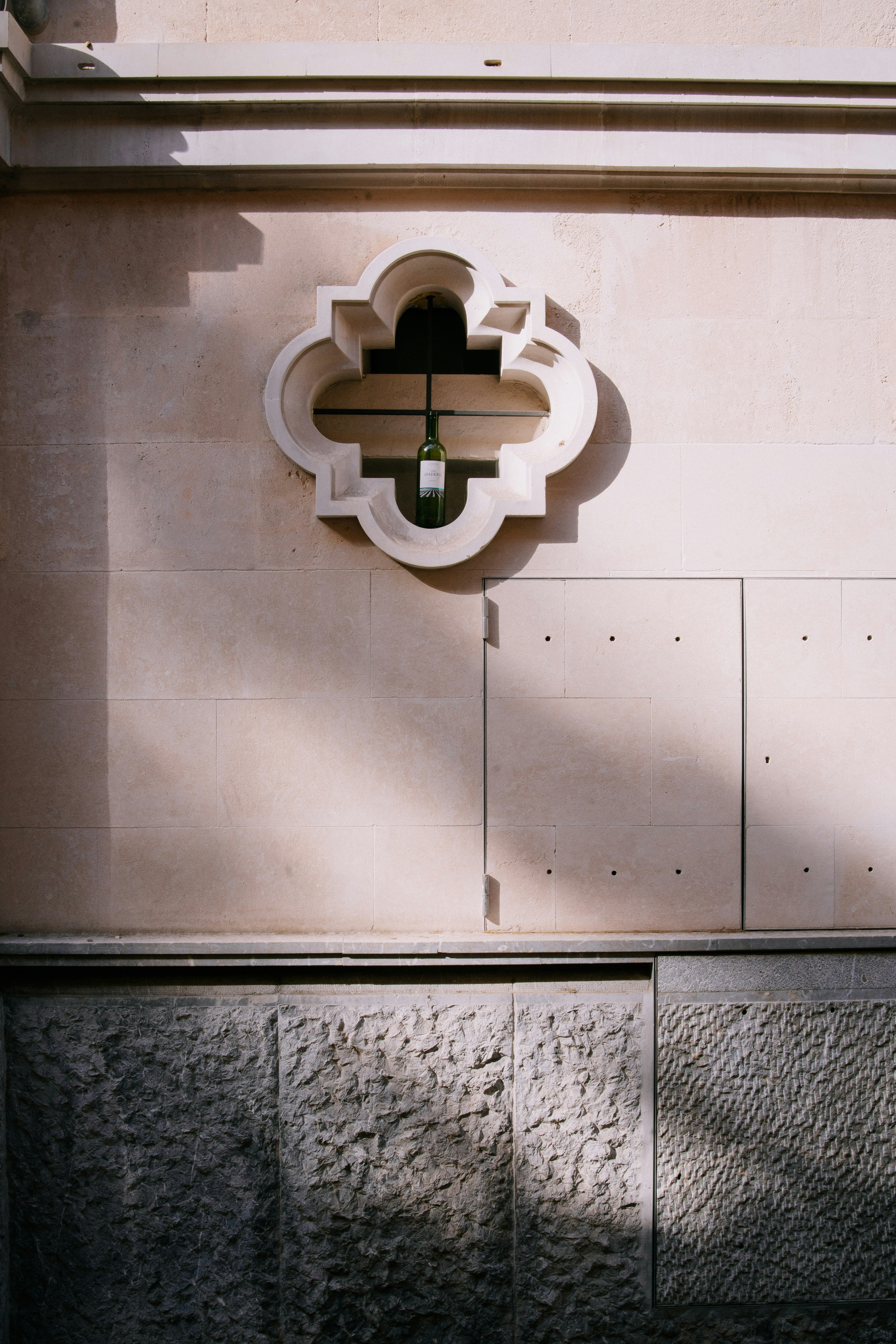 Architectural Lattice Window with Bottle Accent