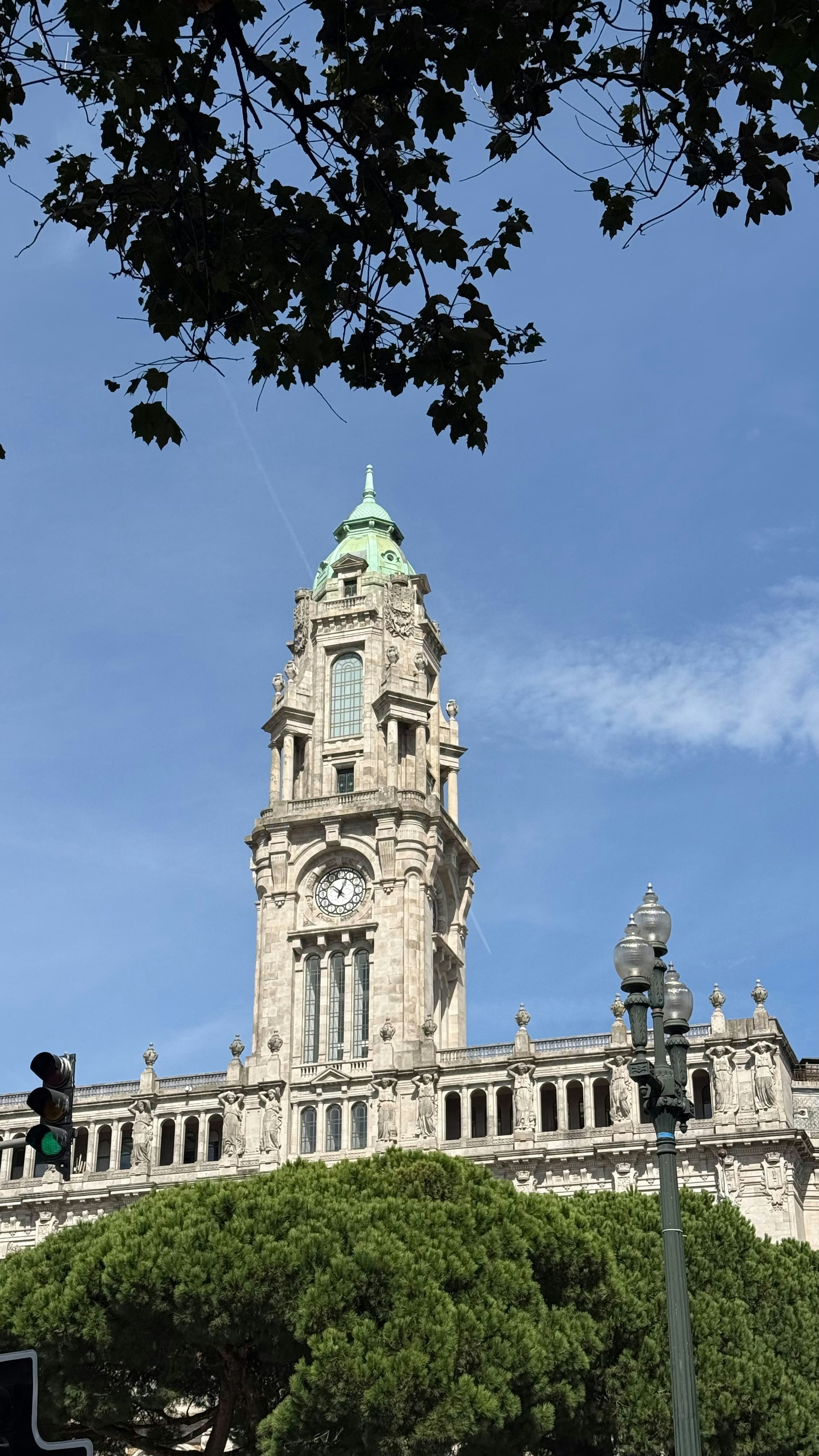 Clock Tower Rising Above the City: A Stone Sentinel Under a Clear Sky