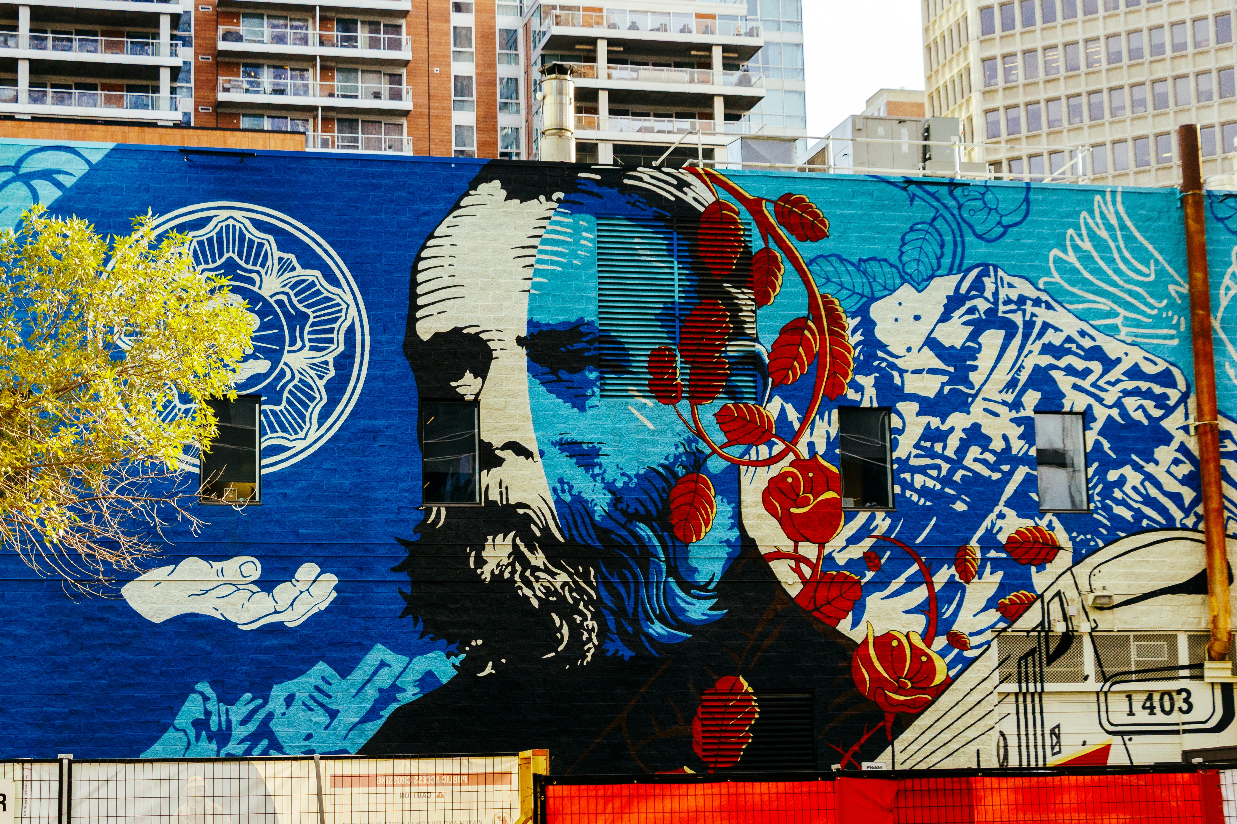 Mosaic of a Silhouette: A City Wall Portrait in Blue