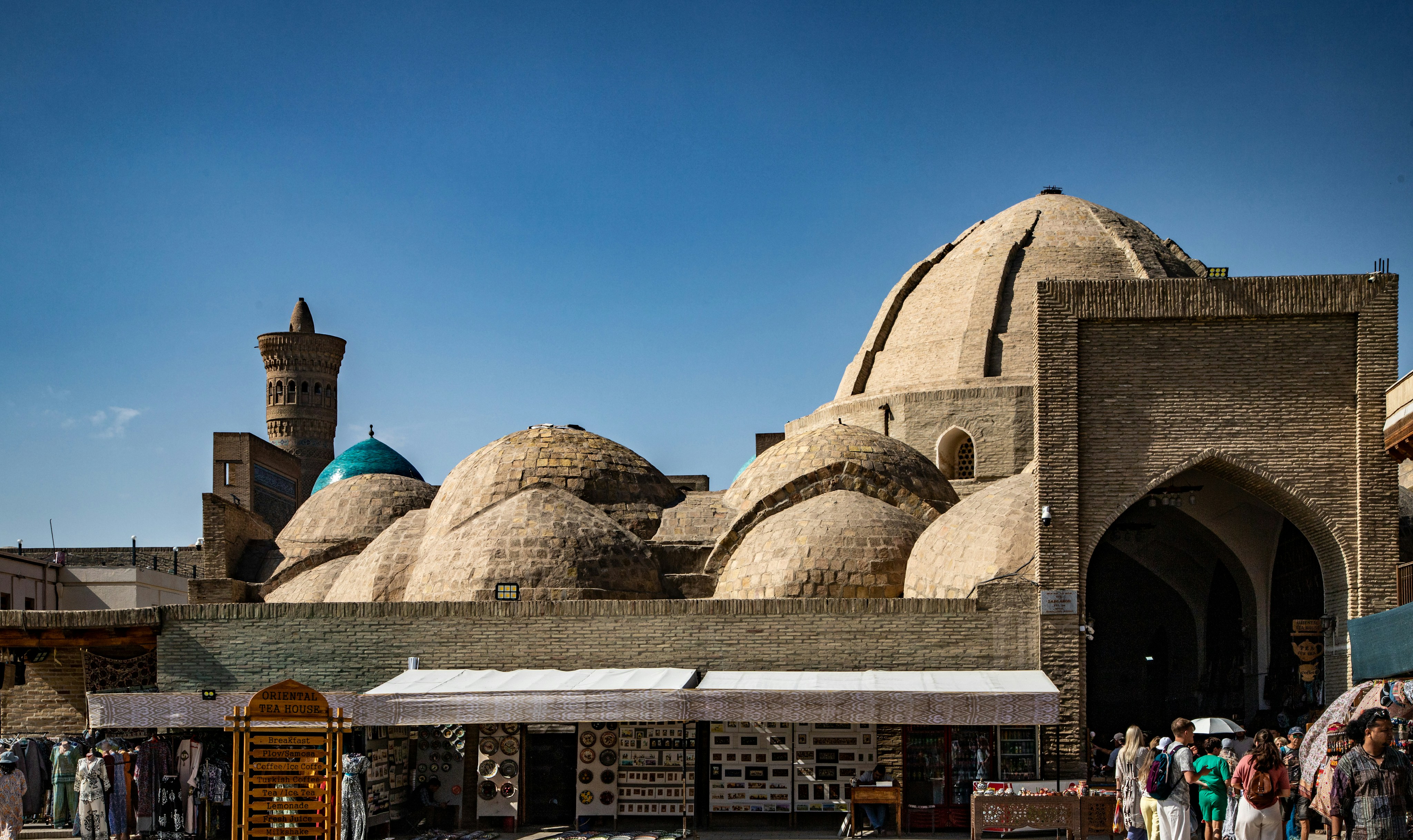 Market Facade Under the Domes: A Riverside of Tourists