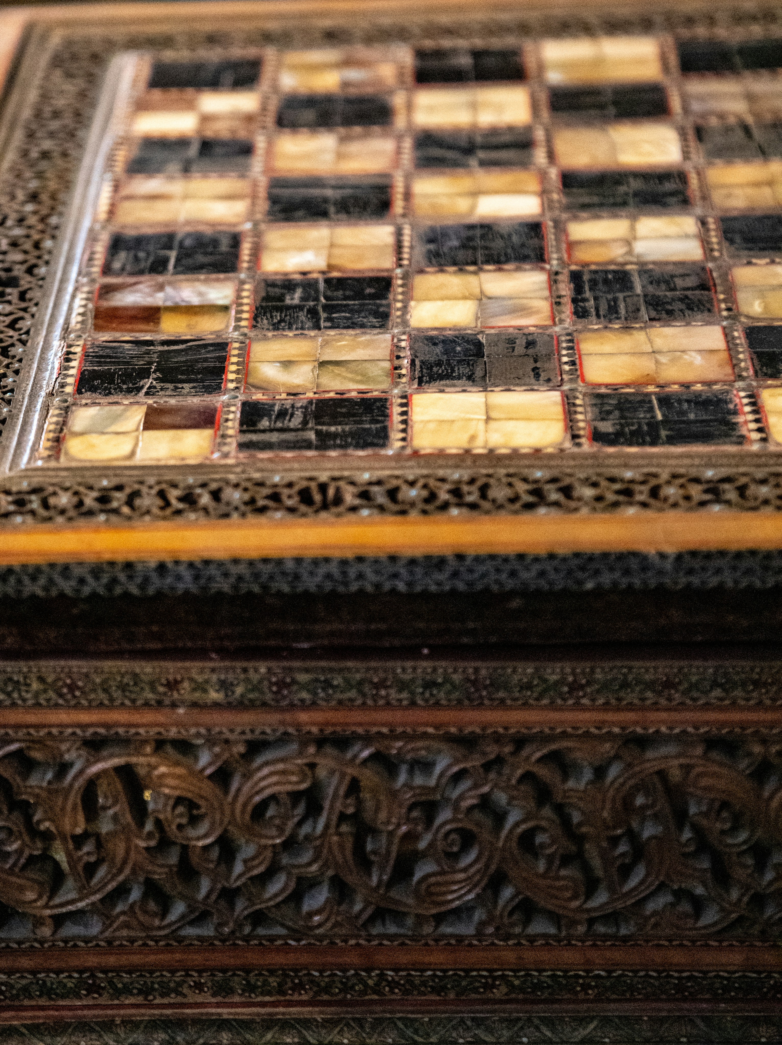 Inlaid Moorish Tilework Resting on Carved Ironwork