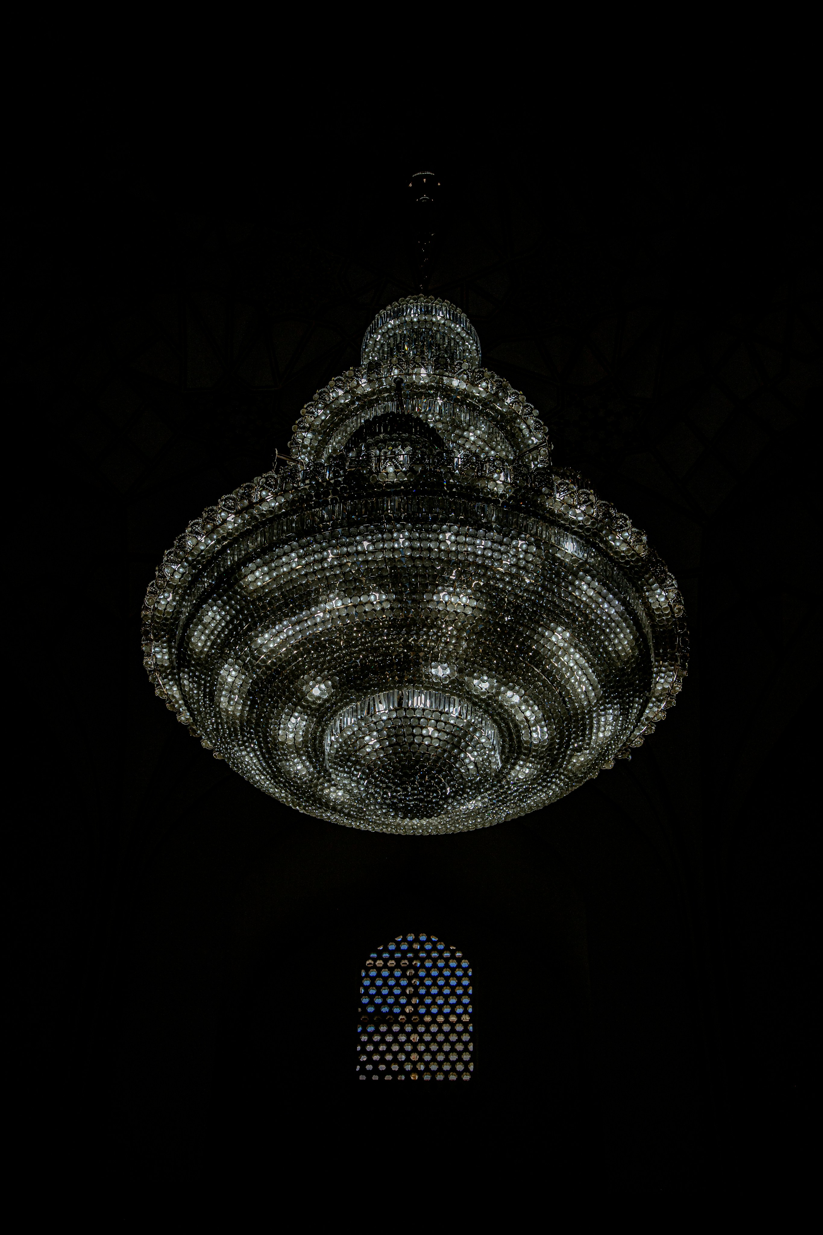 Midnight Crystal: A Halo of Light from a Grand chandelier