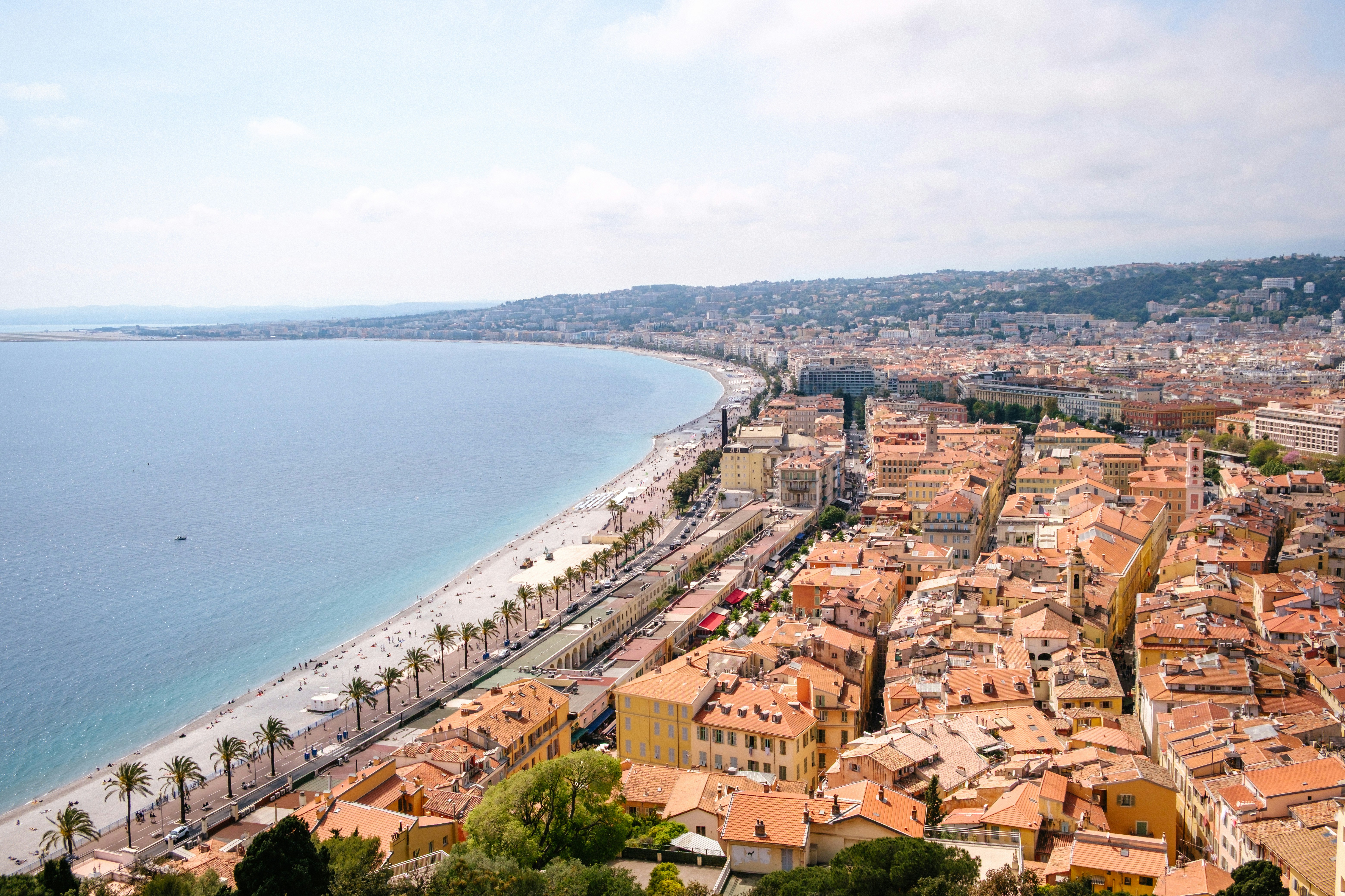 Coastal Terrace: A Mediterranean Town Unfolding Along the Promenade
