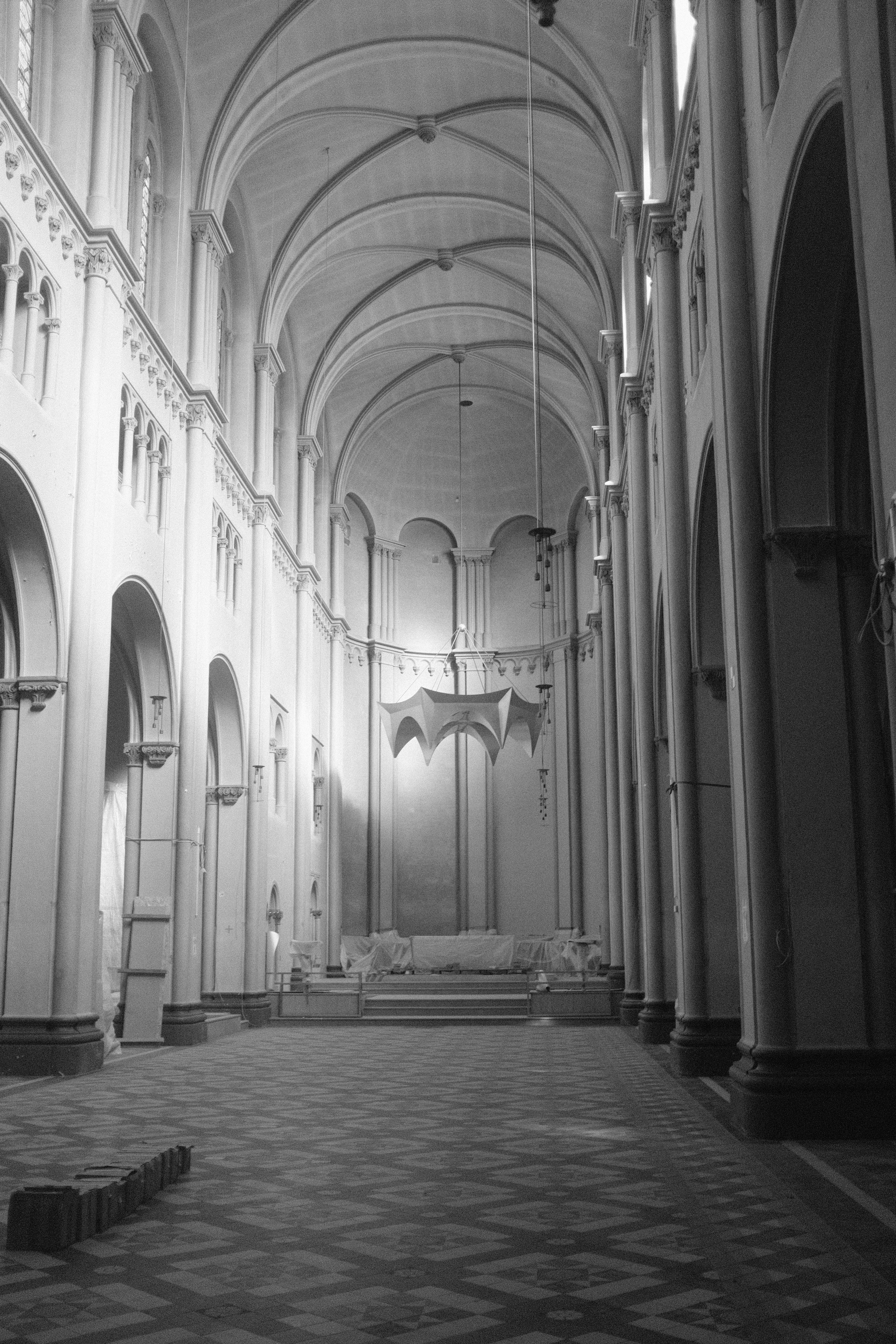 Echoes of the Arched Hallway: Silent Cathedral in Monochrome